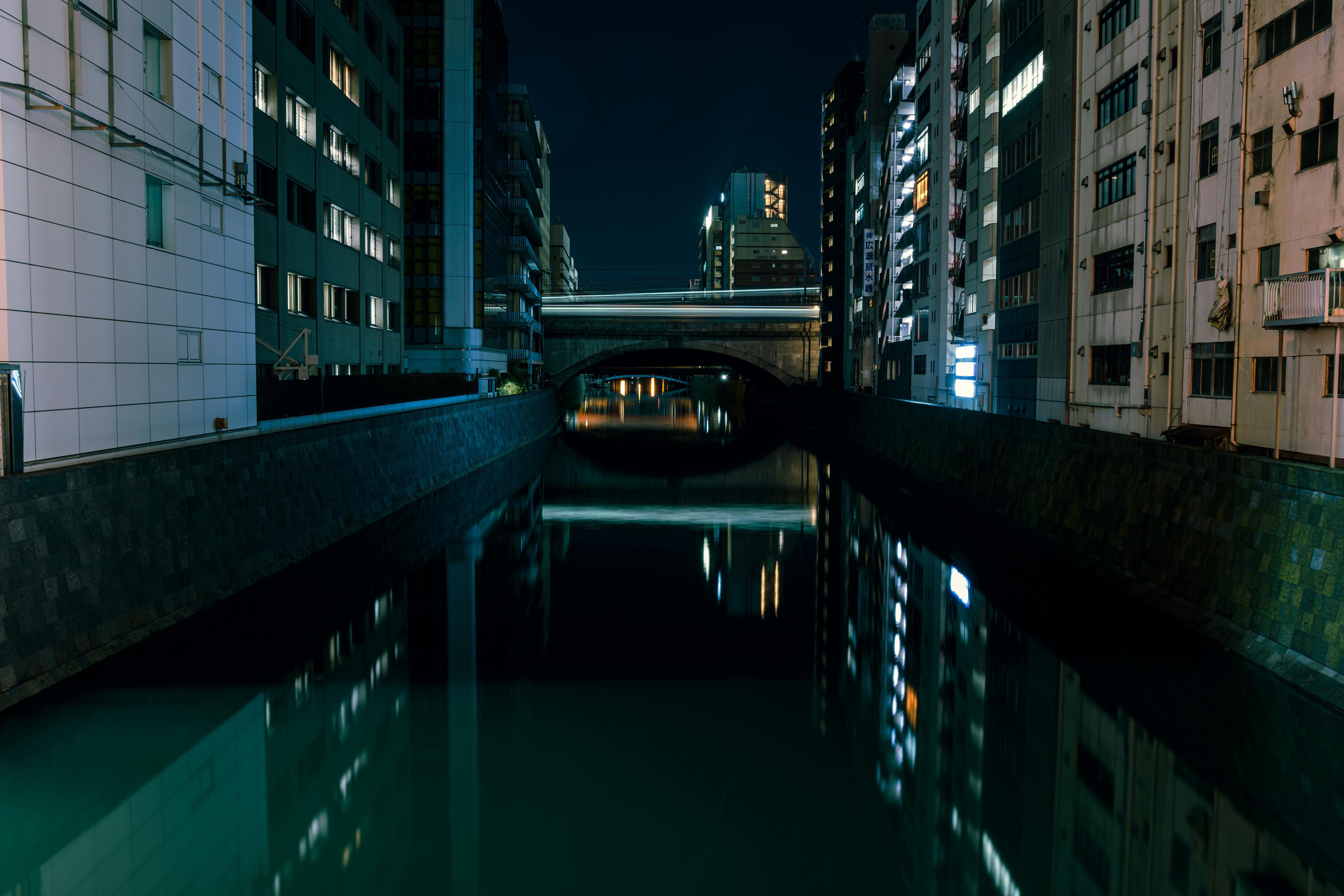 View of a Canal with a Bridge between Apartment Blocks in Akihabara ...