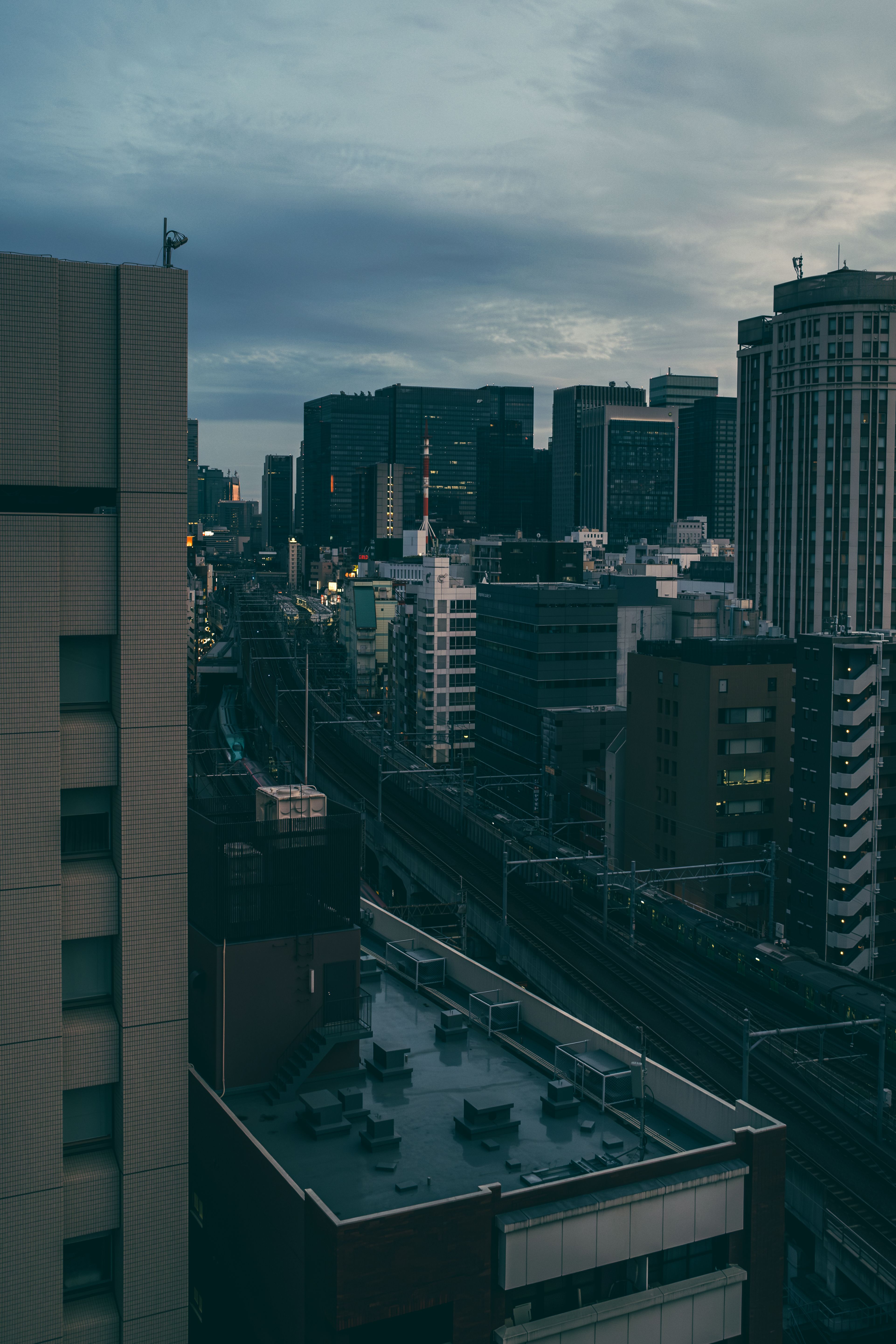 View of a Street and Skyscrapers under a Cloudy Sky in City · Free ...