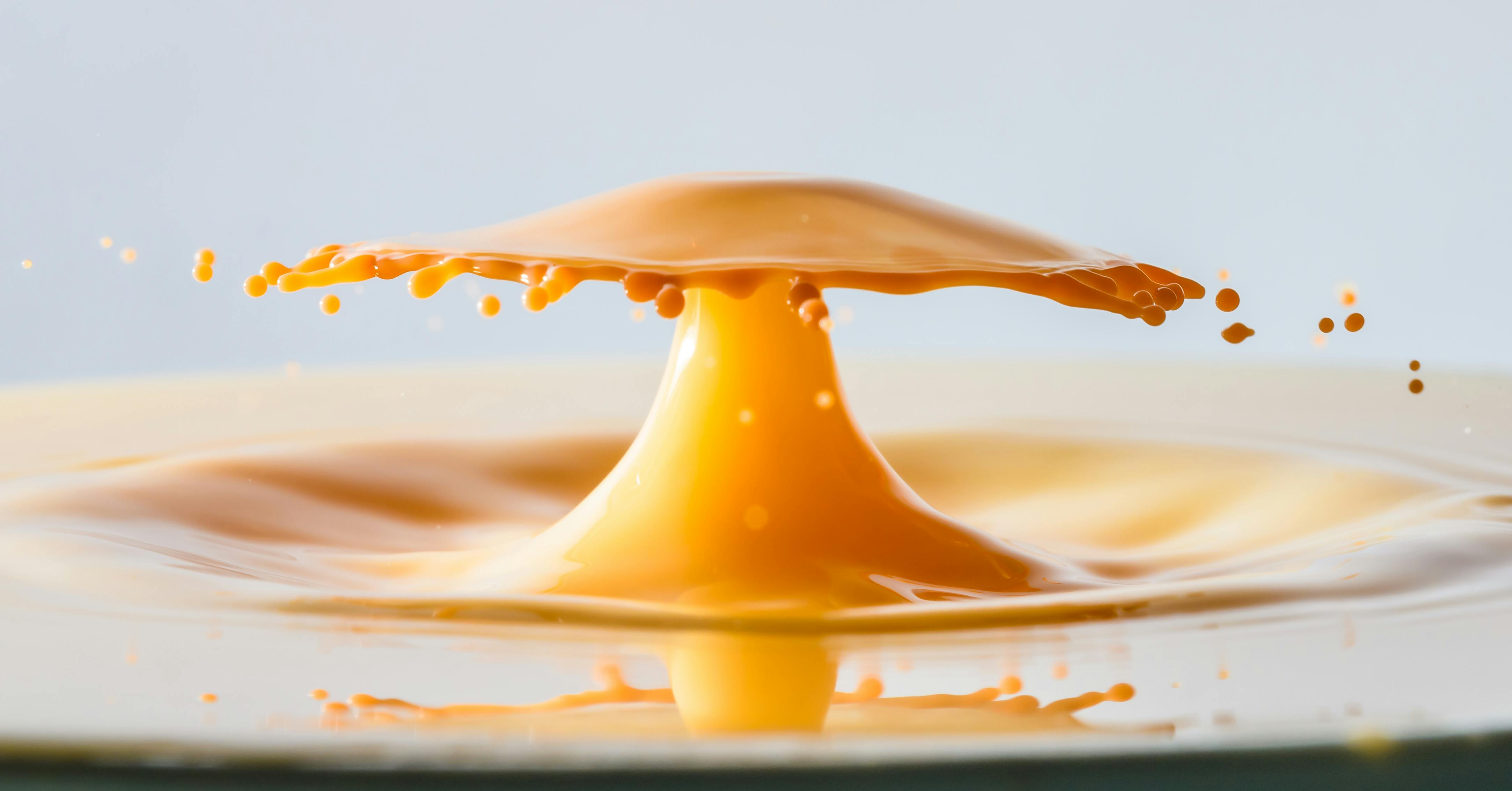 White Liquid on Stainless Steel Spoon · Free Stock Photo