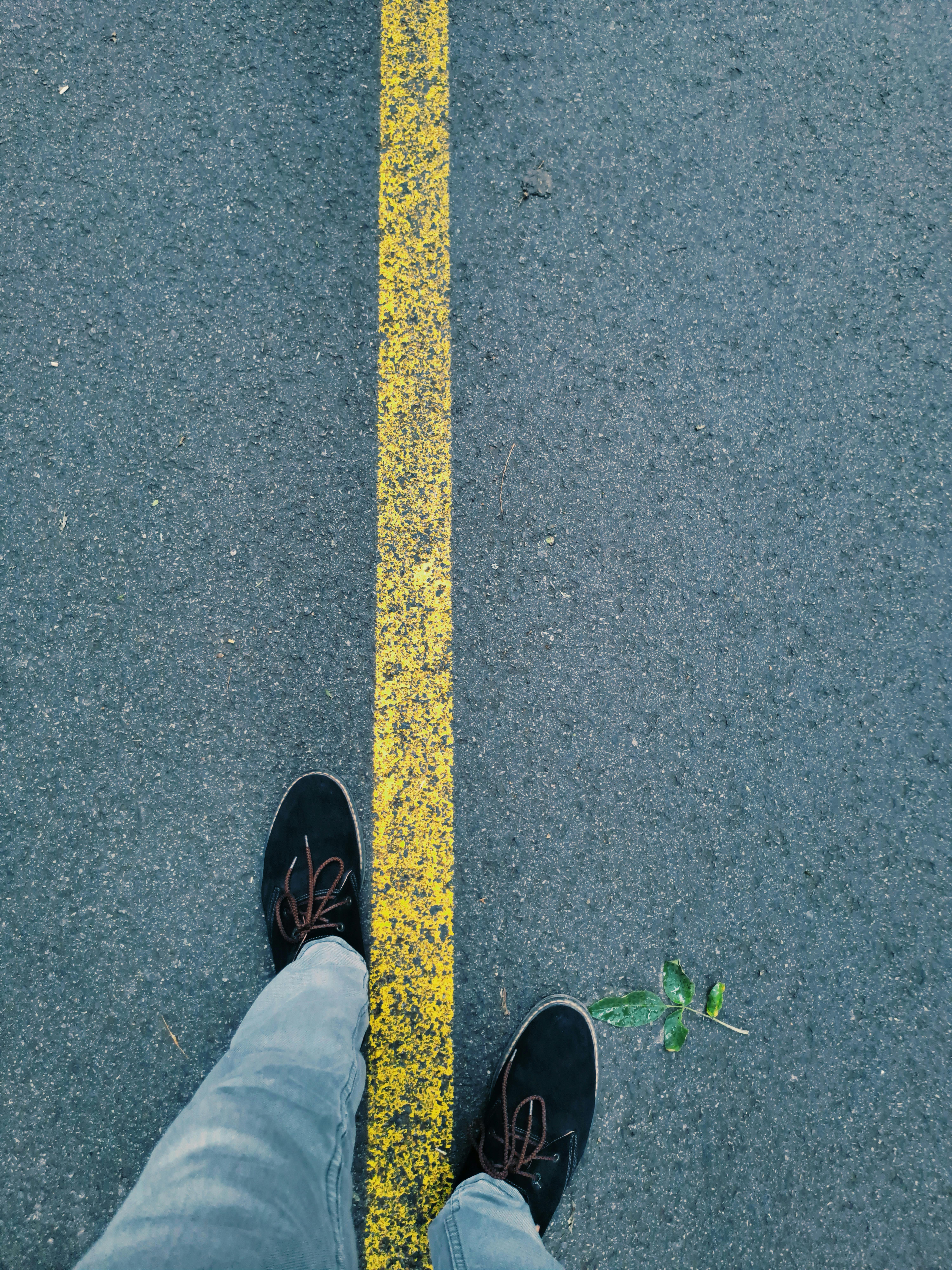 Yellow Line between Feet · Free Stock Photo