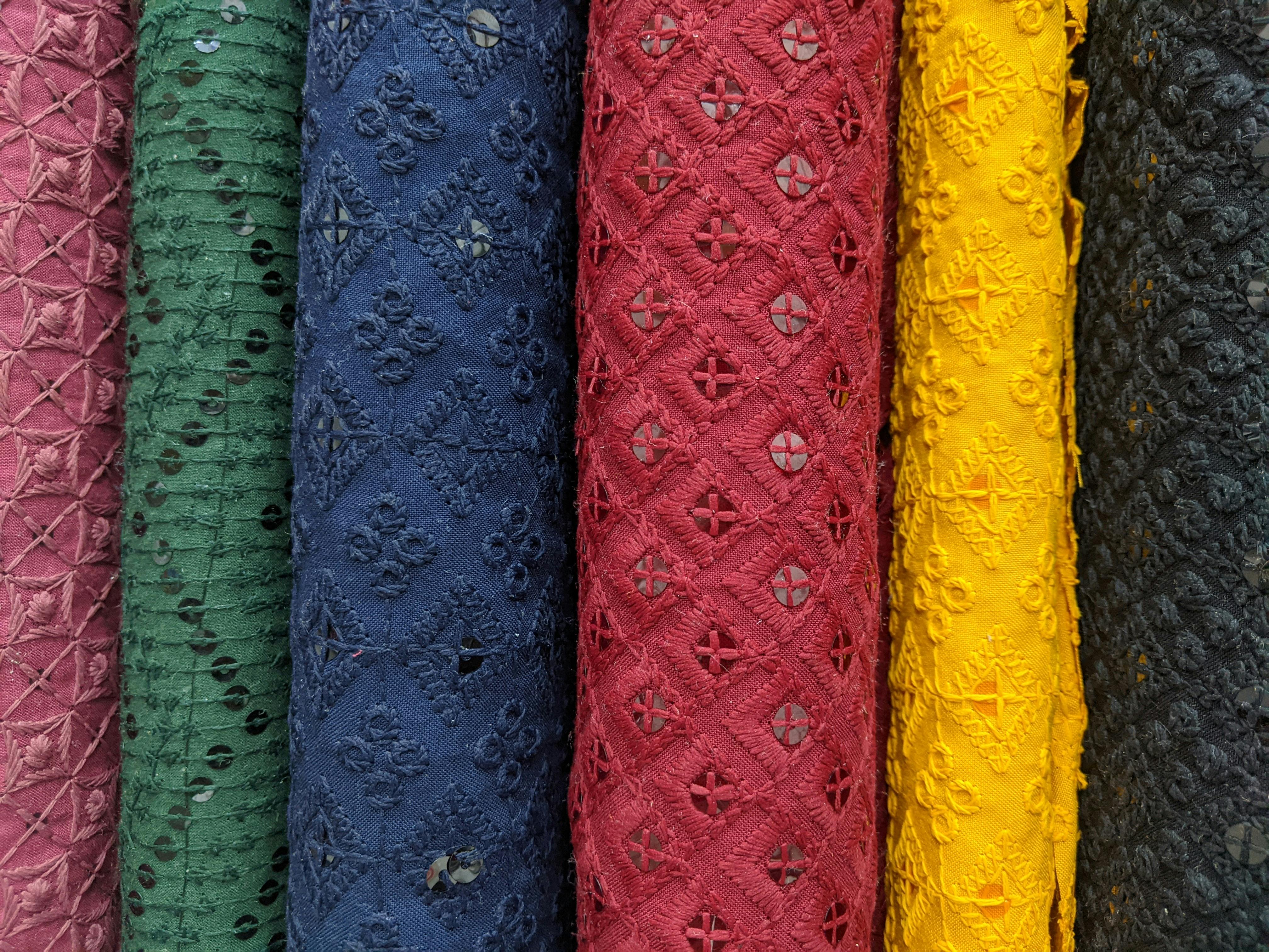 Rolls of Multi Colored Fabrics · Free Stock Photo
