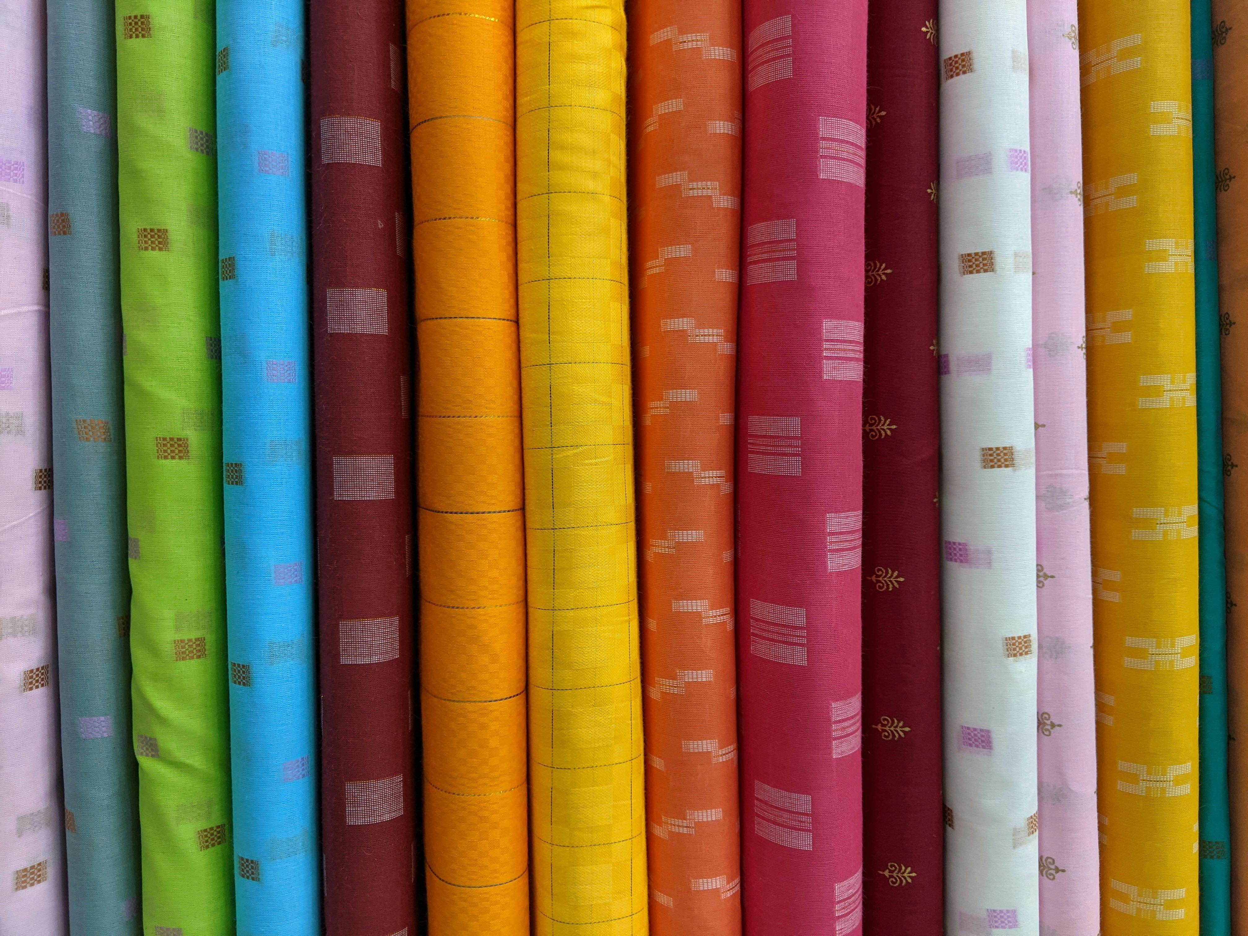 Rolls of Multi Colored Fabrics · Free Stock Photo