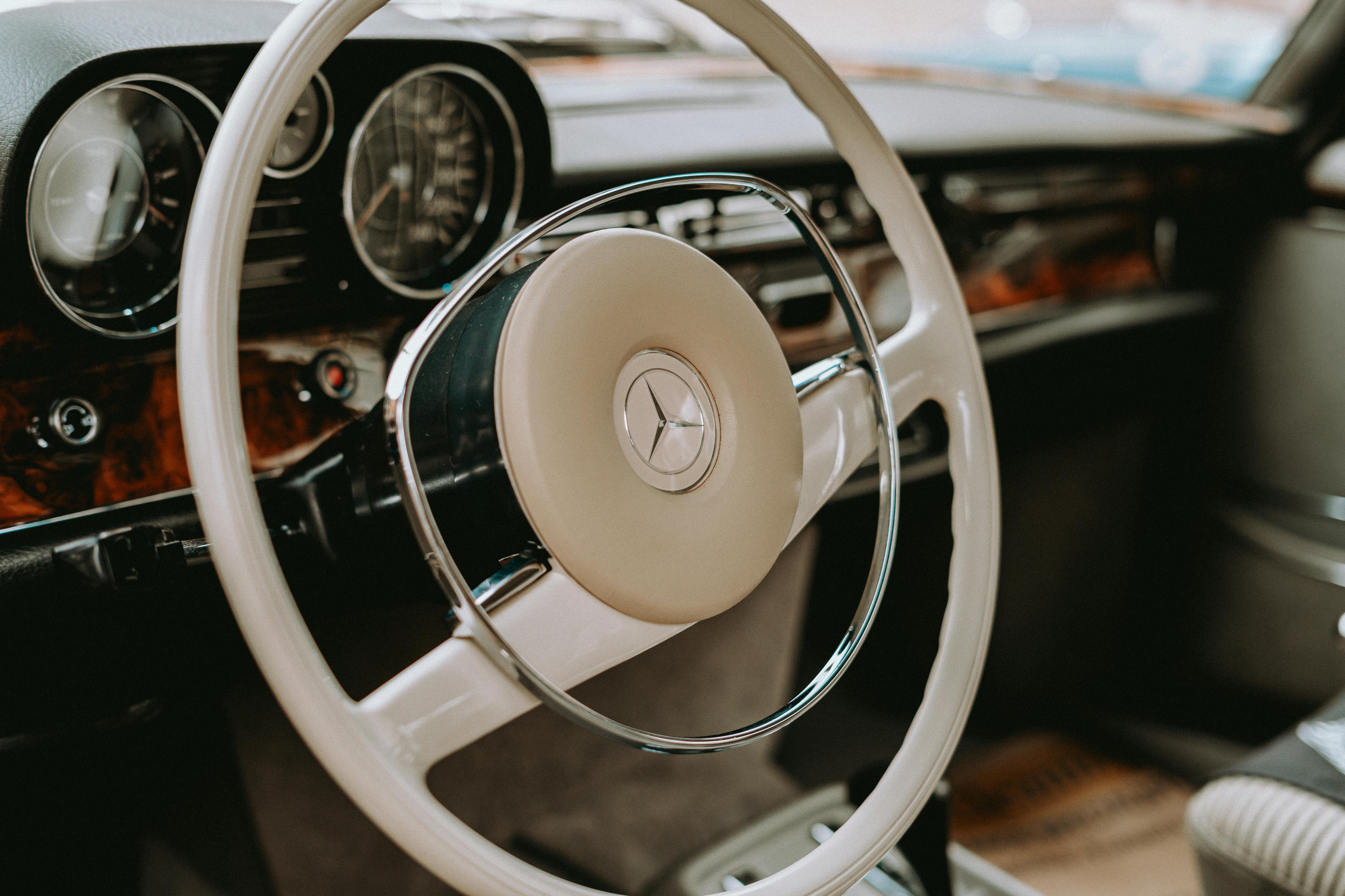 Close-up of a Steering Wheel in a Vintage Mercedes-Benz · Free Stock Photo