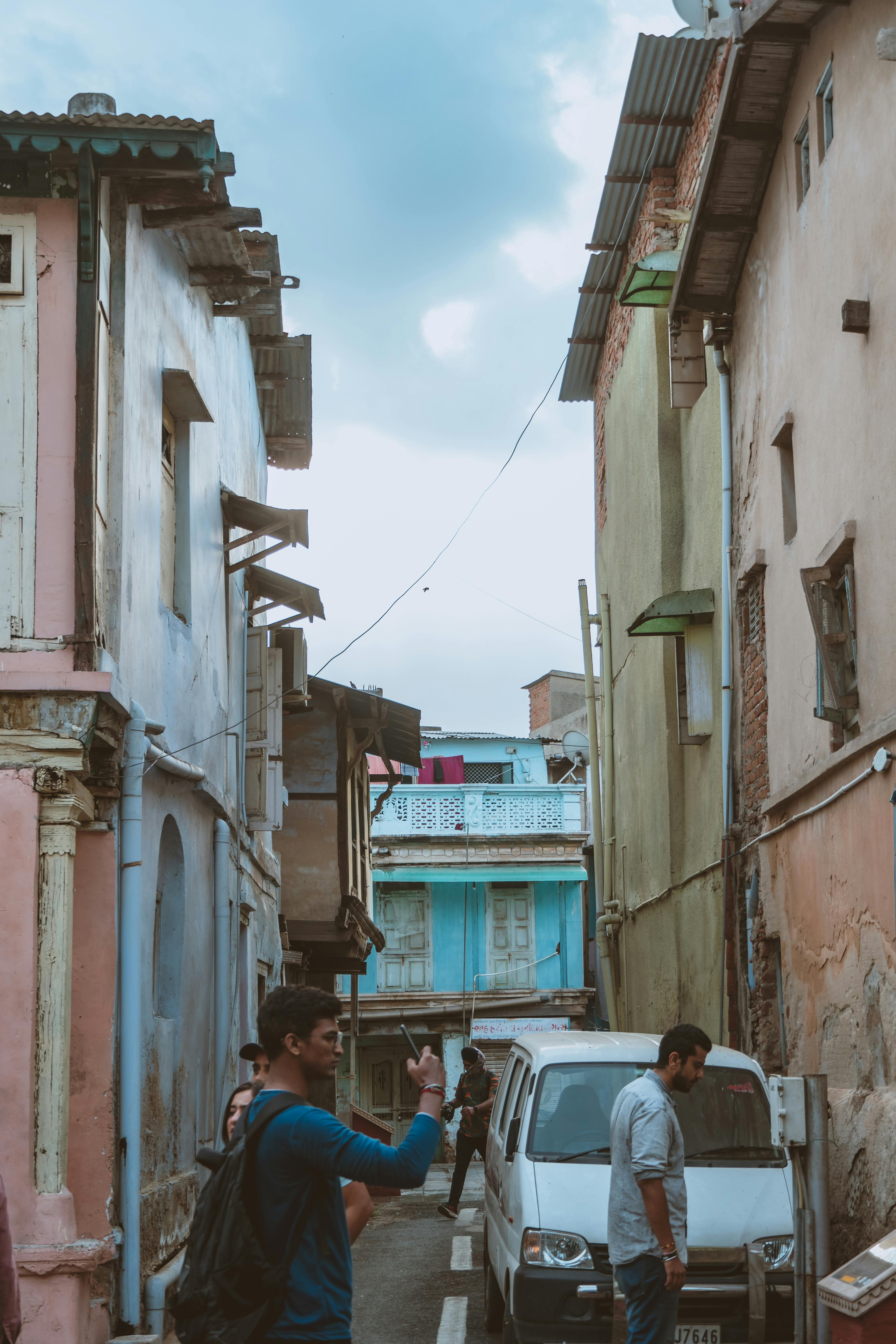 People on Narrow Street in Town · Free Stock Photo