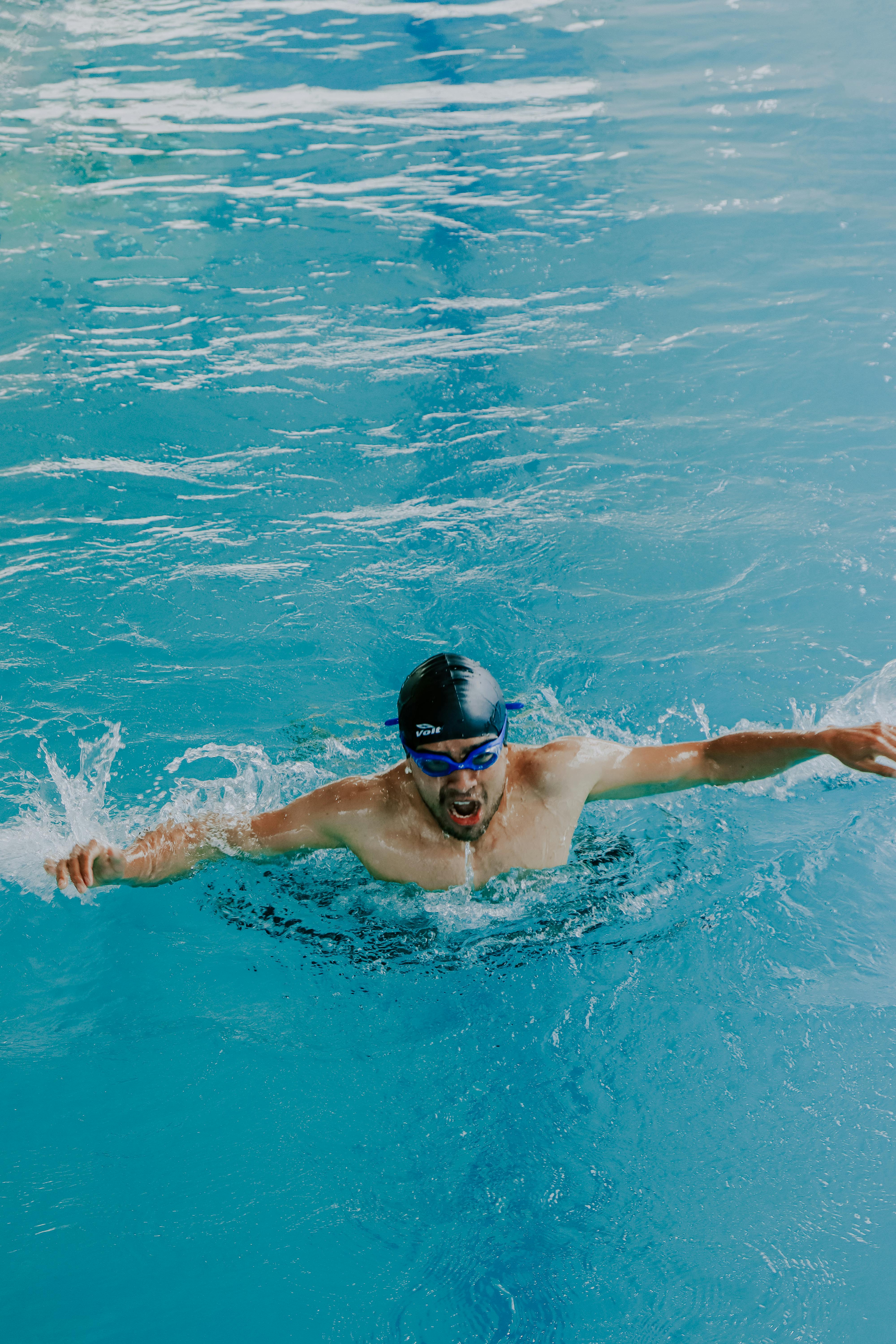 Man Swimming at Pool · Free Stock Photo
