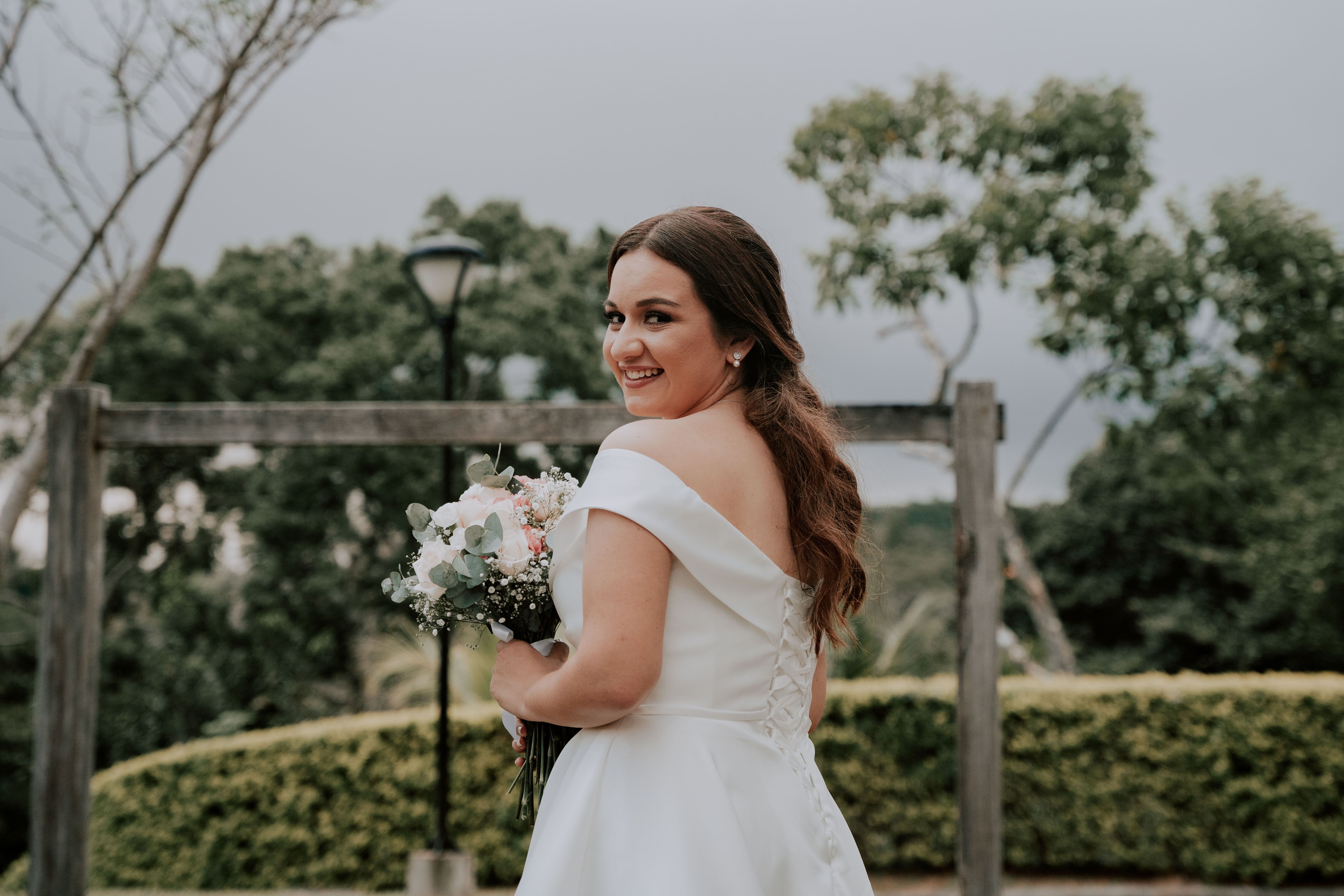 Smiling Bride with Flowers Bouquet · Free Stock Photo