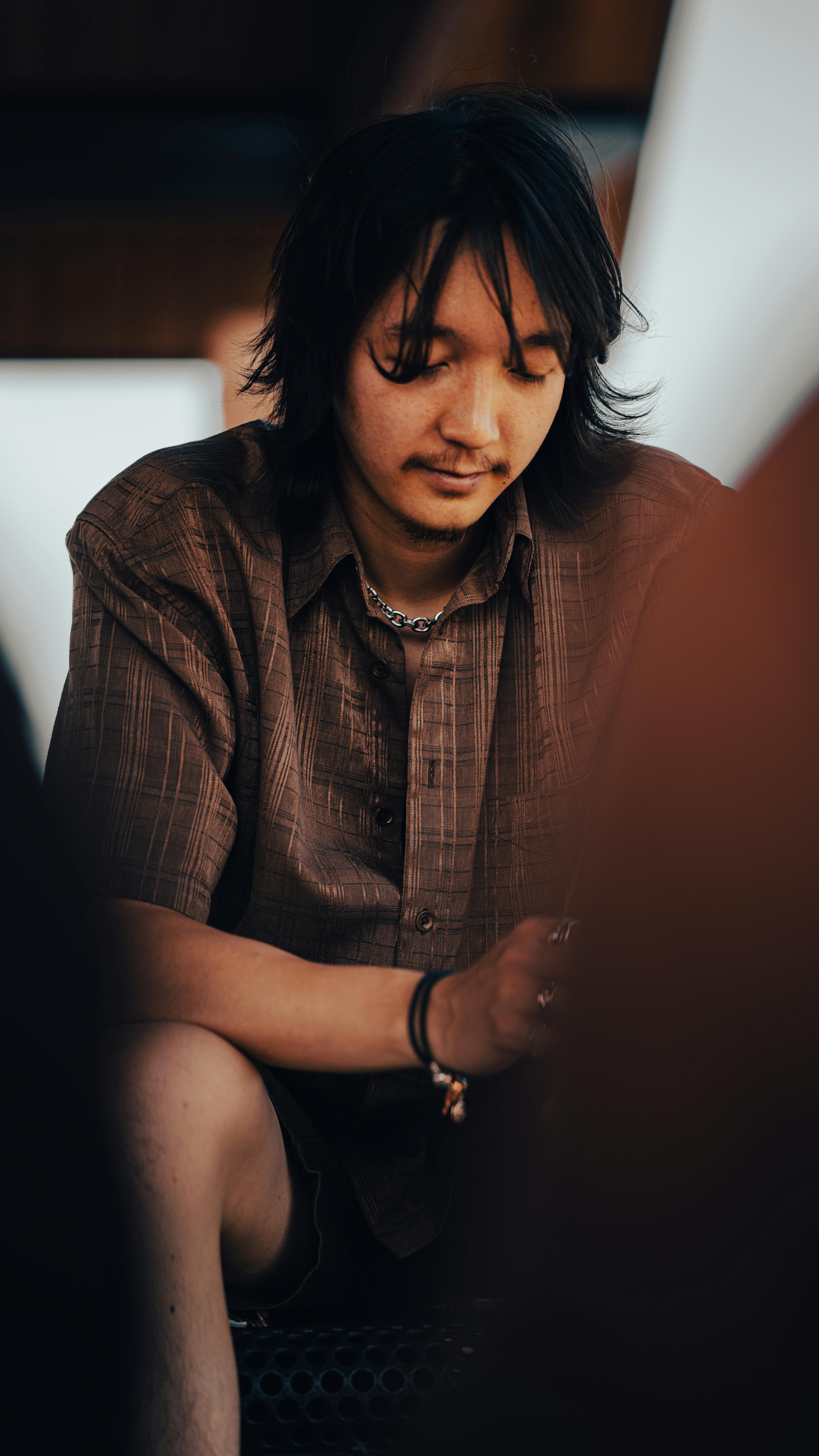 Portrait of a Man Looking Down · Free Stock Photo