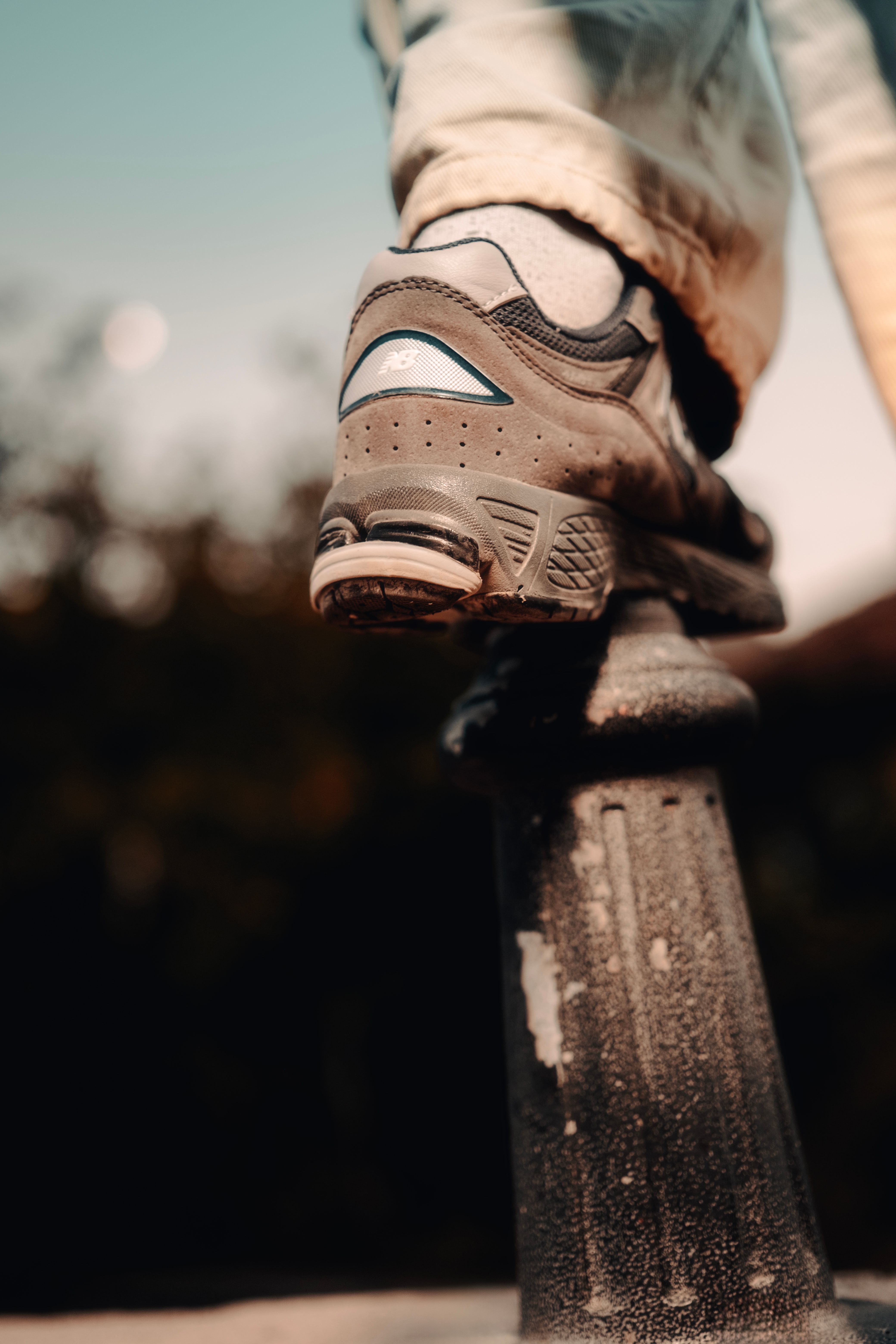 A Person Wearing White Crocs · Free Stock Photo