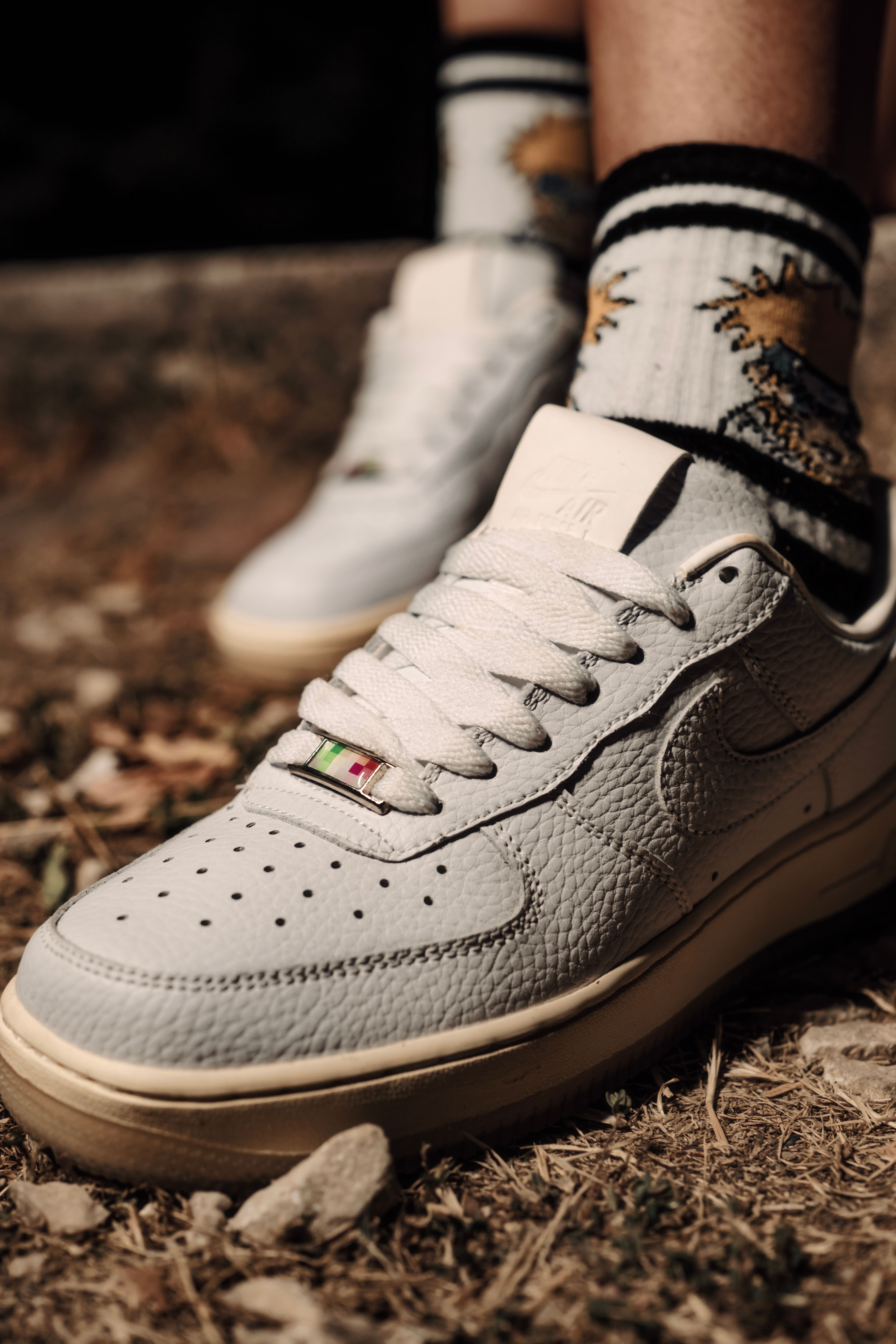 A Person Wearing Nike Air Force 1 Sneakers · Free Stock Photo