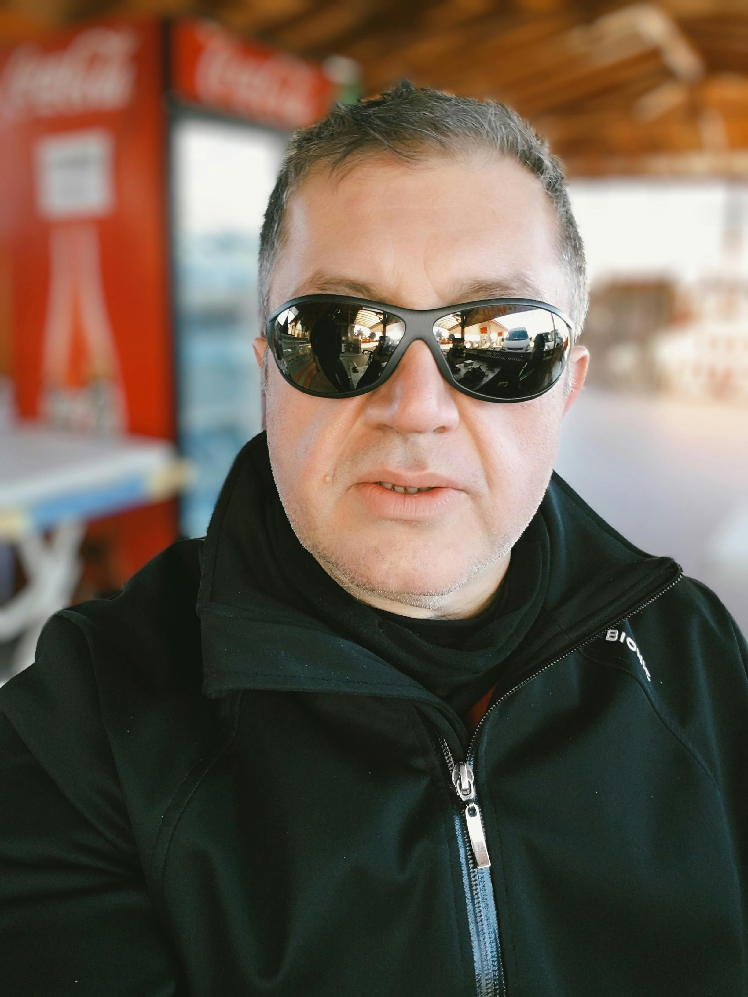 Portrait of Rapper in Sunglasses and Beanie · Free Stock Photo