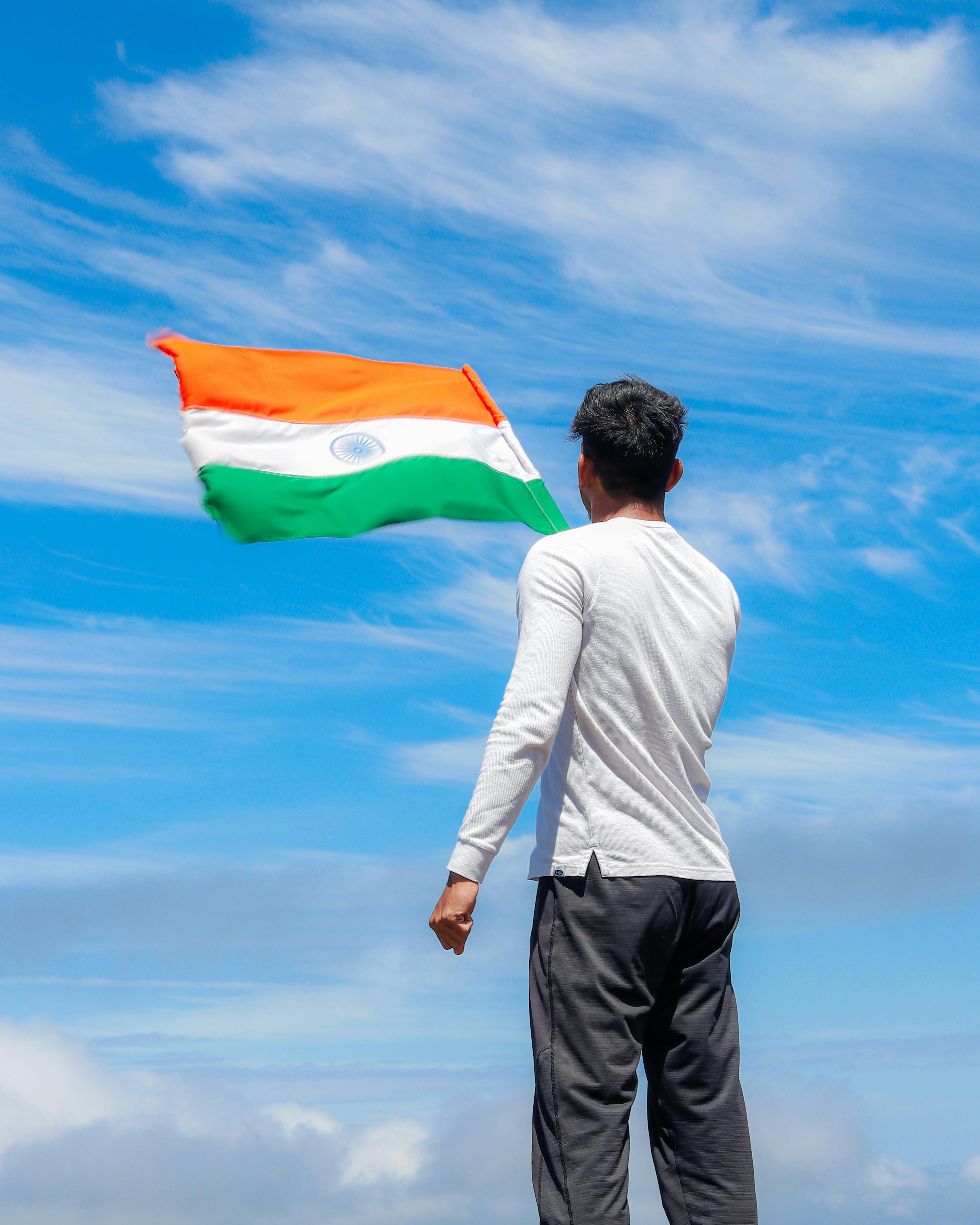 Back View of Man Standing with Indian Flag · Free Stock Photo