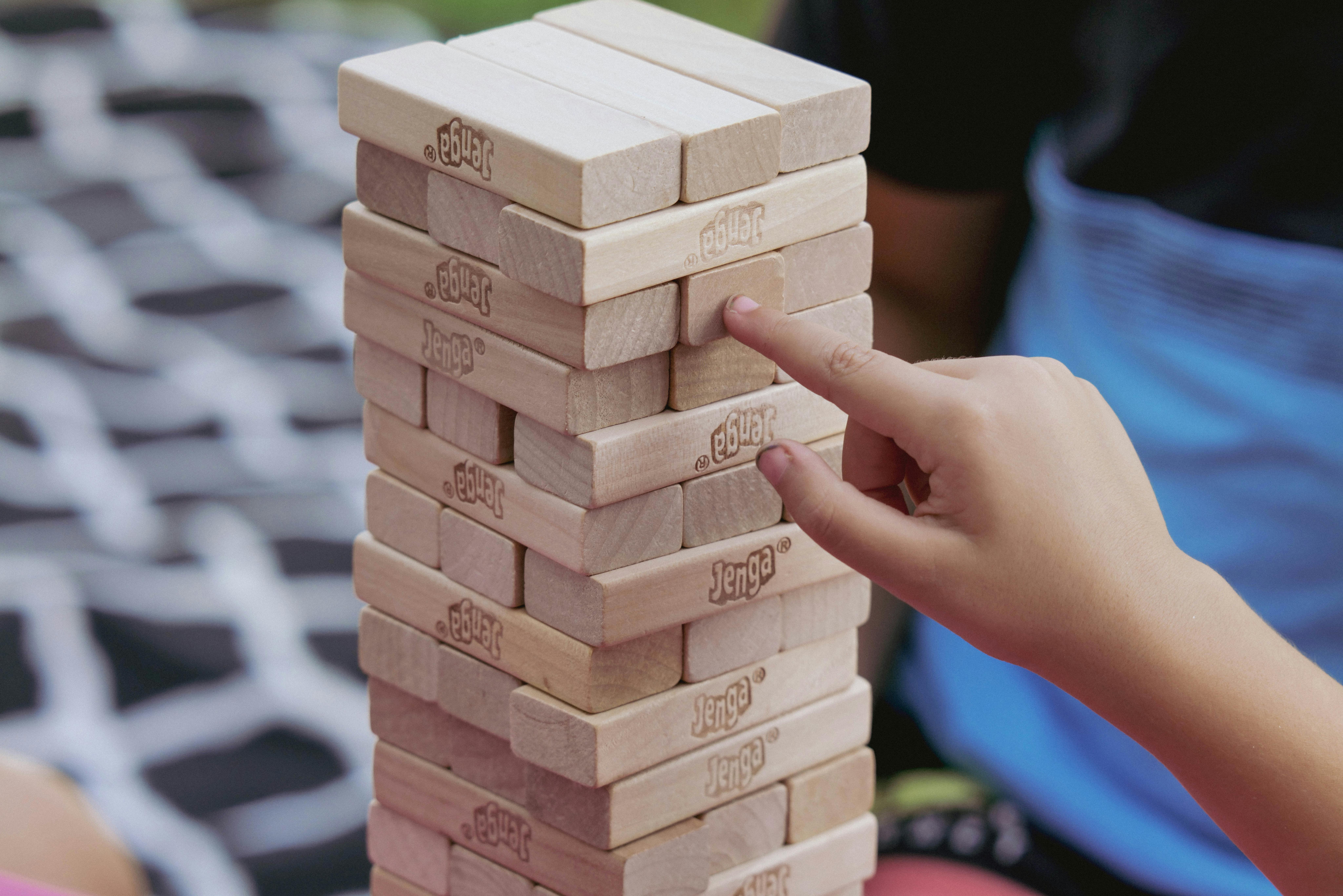 Playing Jenga · Free Stock Photo