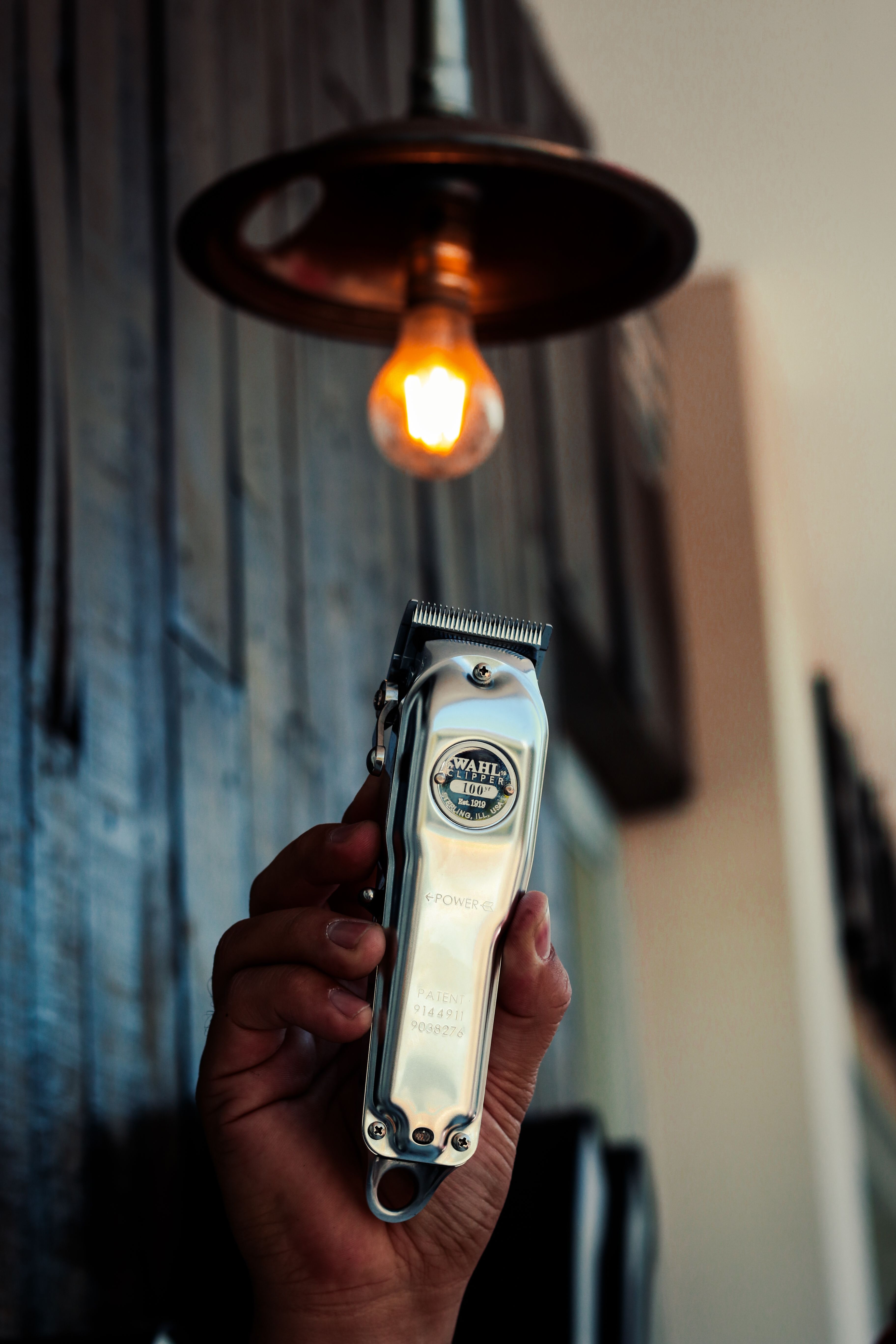 Hand Holding Hair Trimmer · Free Stock Photo