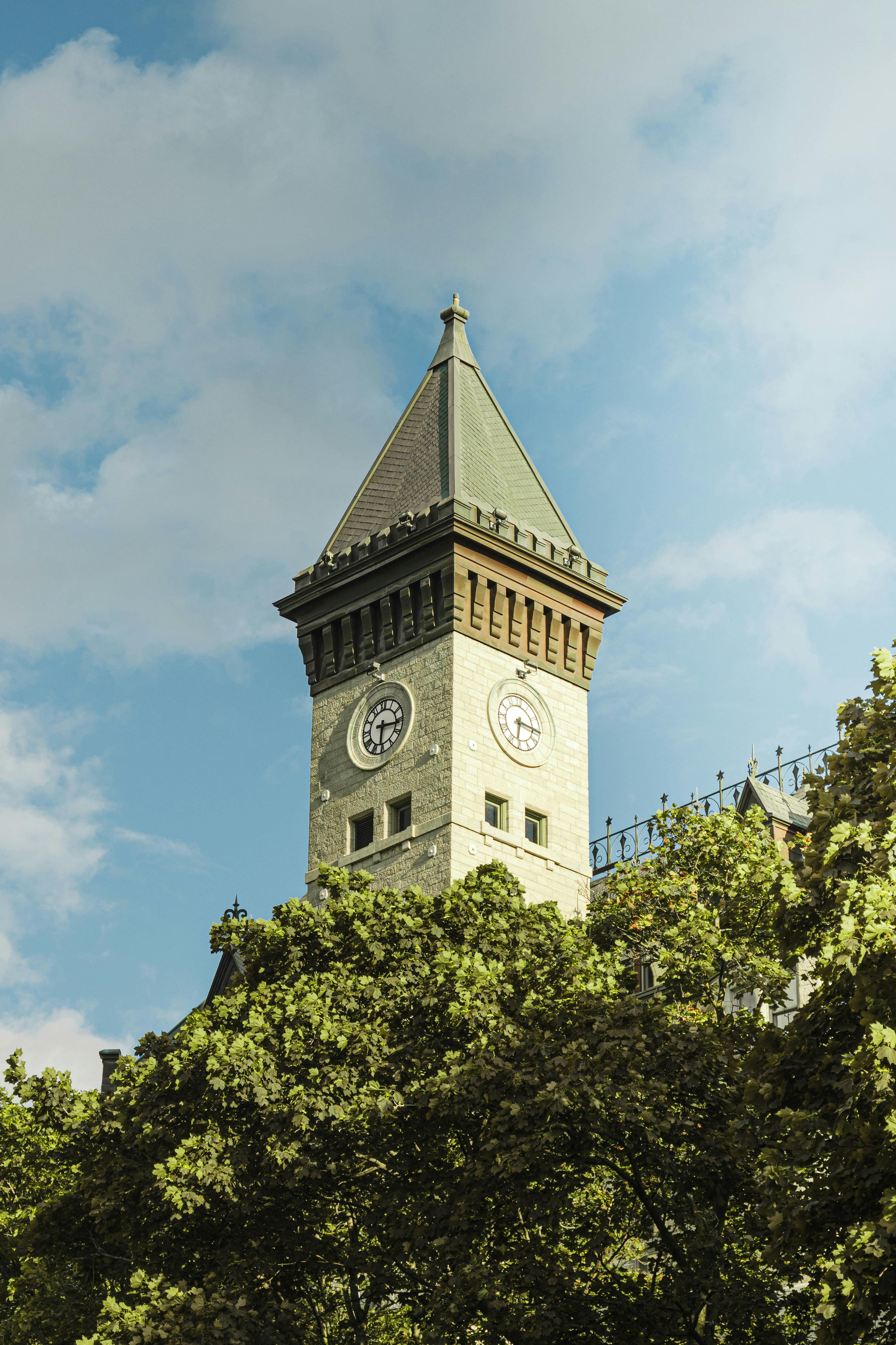 Photo of a Brown Clock Tower · Free Stock Photo