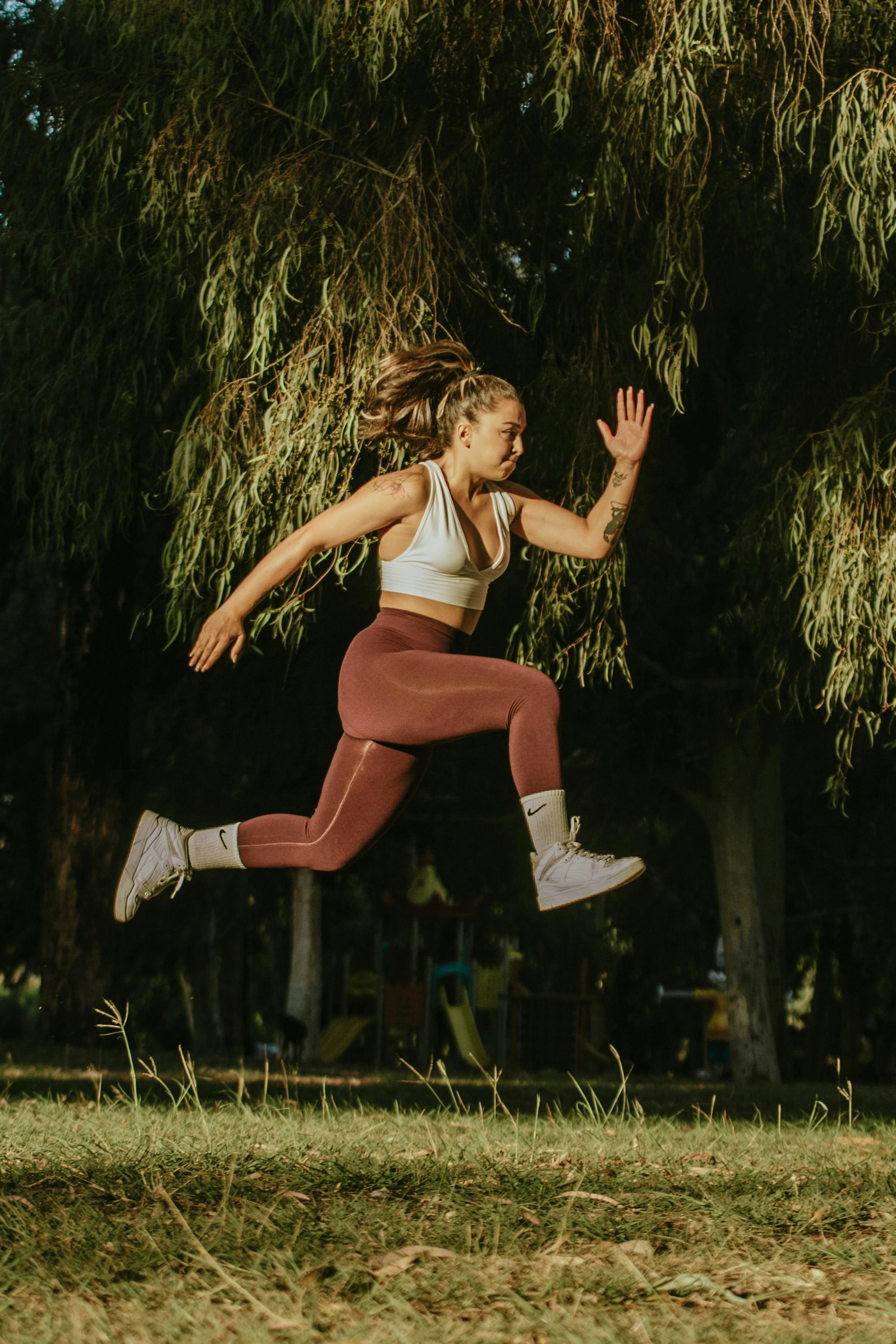 Photo of Man Jumping on the Street · Free Stock Photo
