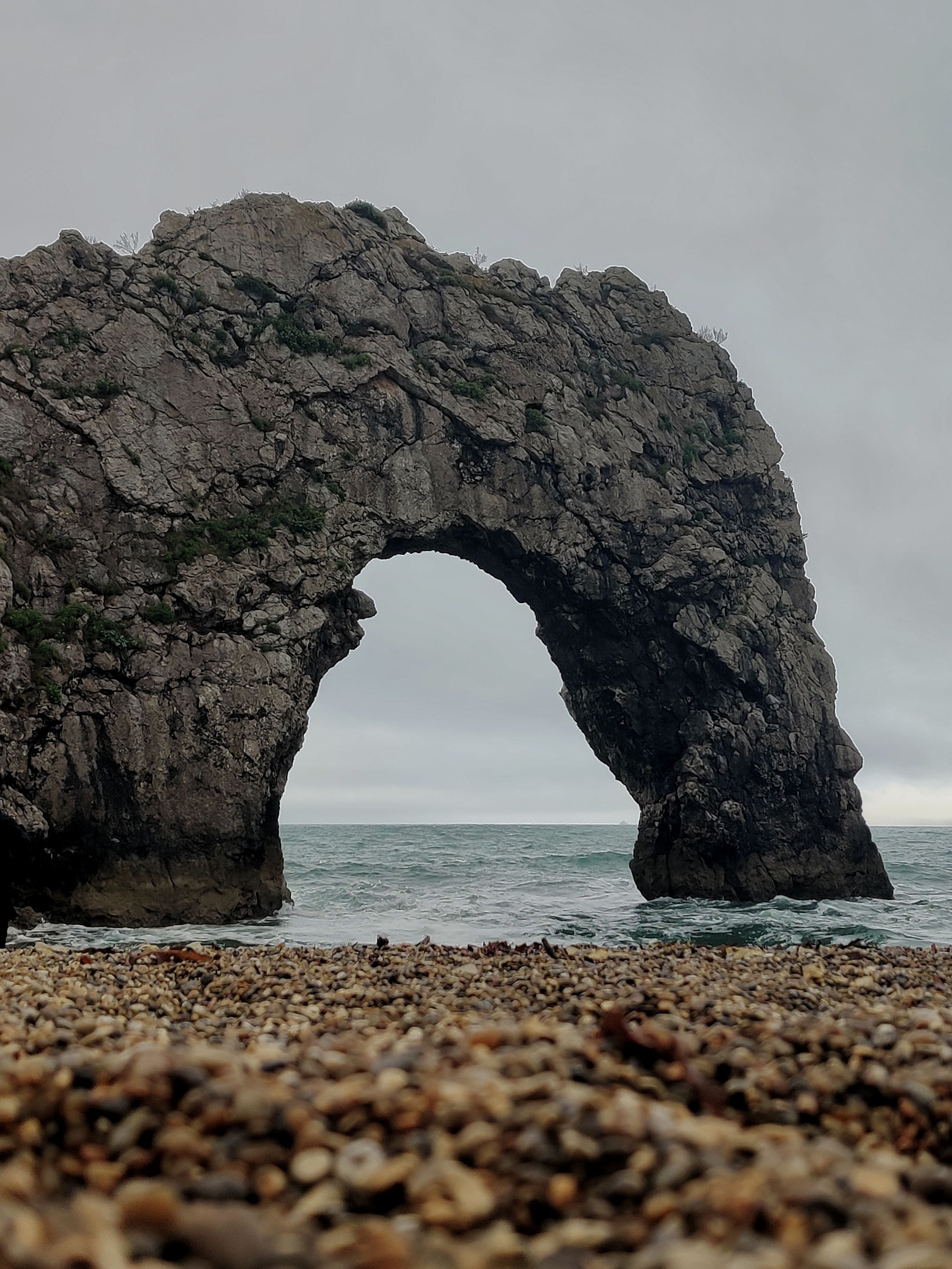 Stone Arch on Seashore · Free Stock Photo