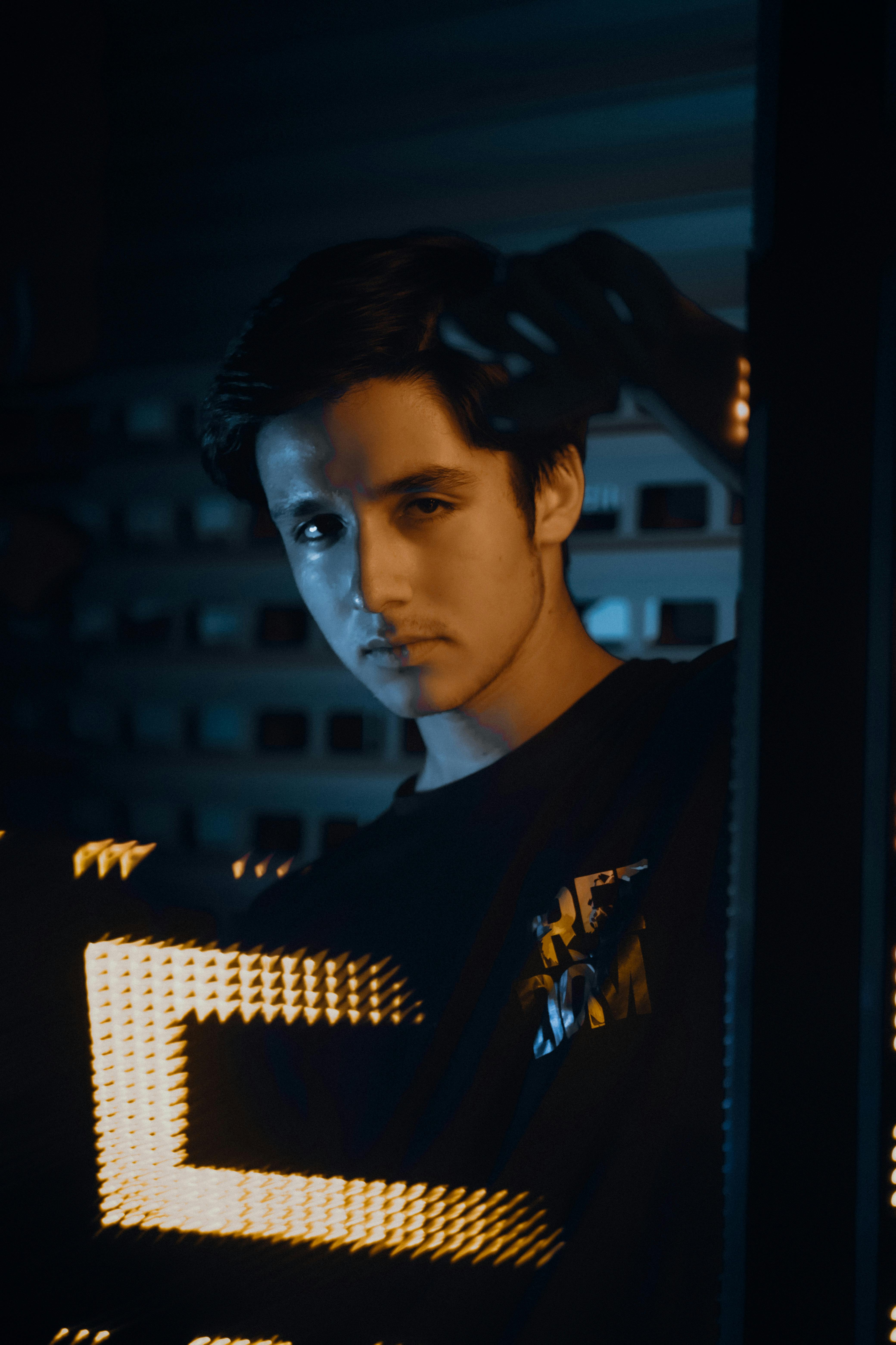 Portrait of Man behind Window · Free Stock Photo