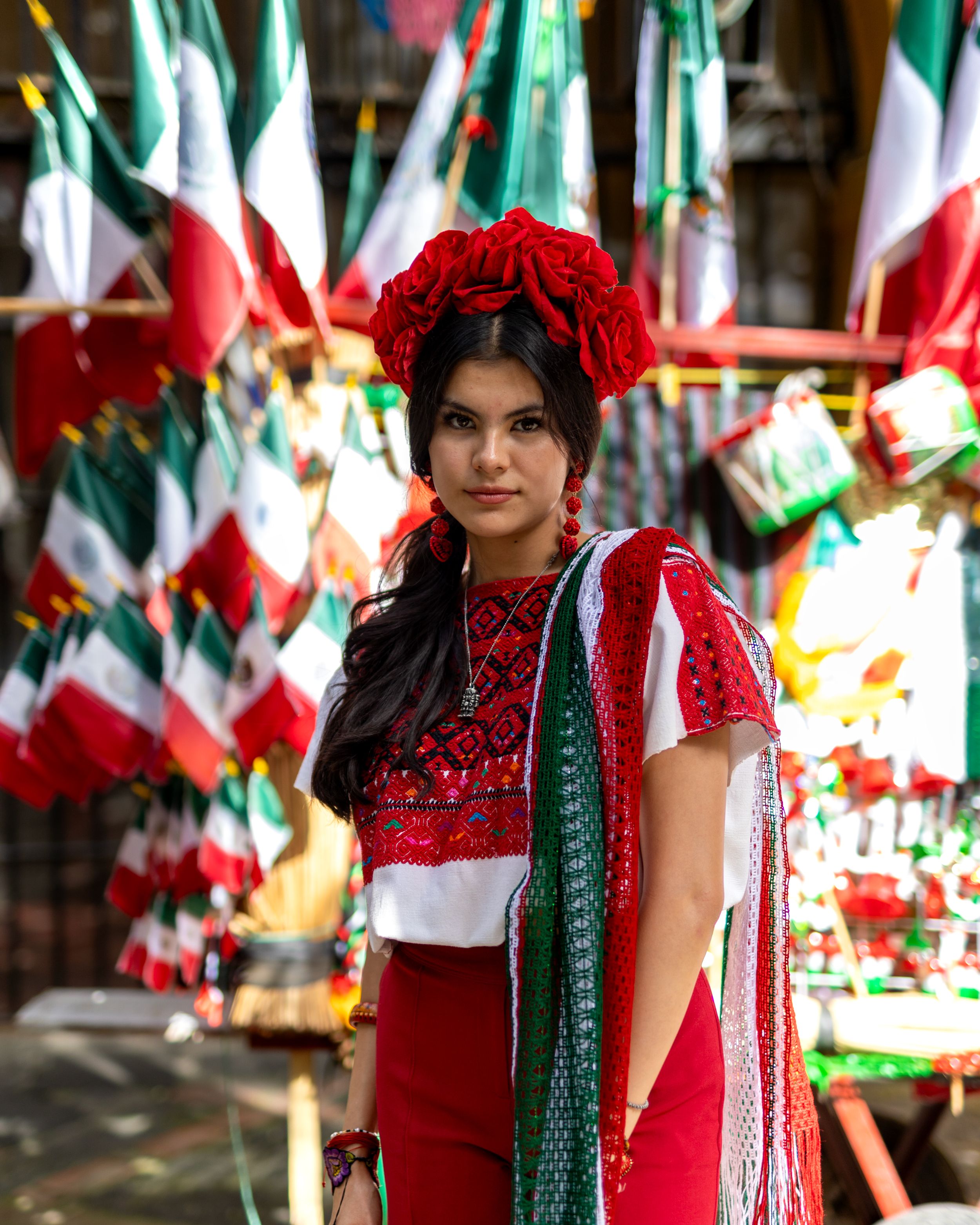 A woman in mexican clothing poses for a photo · Free Stock Photo