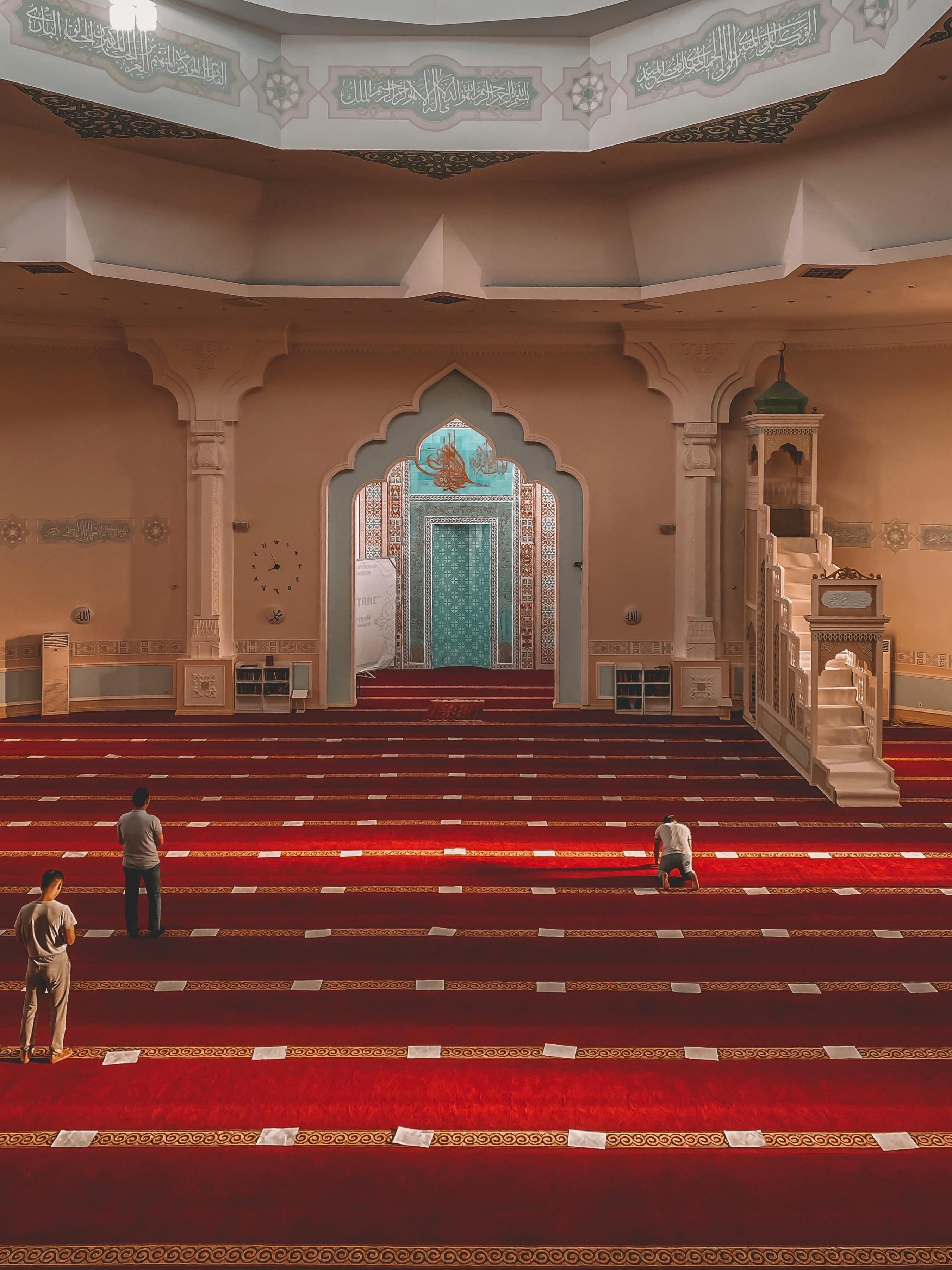 Men in the Prayer Hall of the Mosque in Front of the Mihrab · Free ...