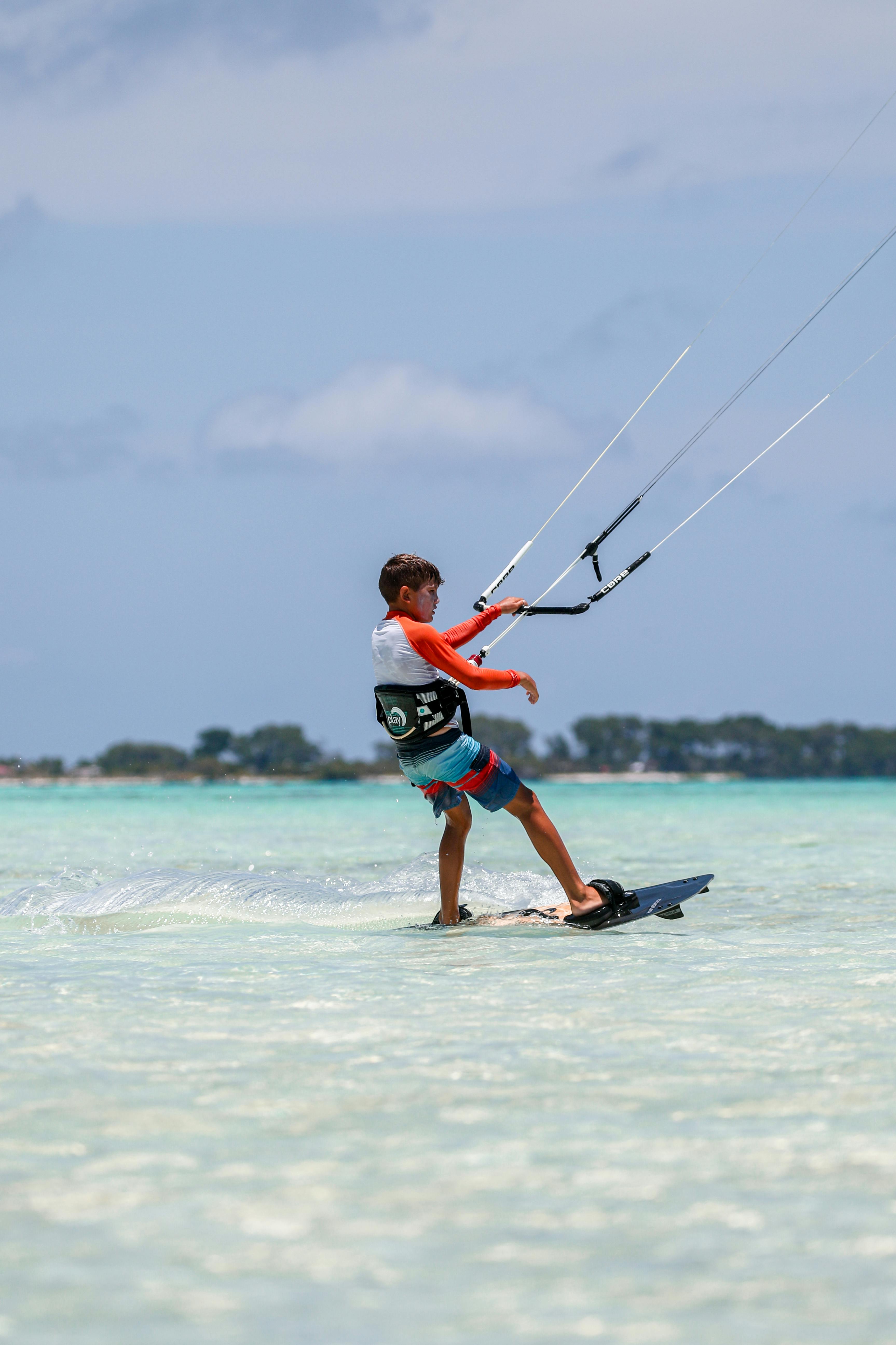 Boy while Kitesurfing · Free Stock Photo