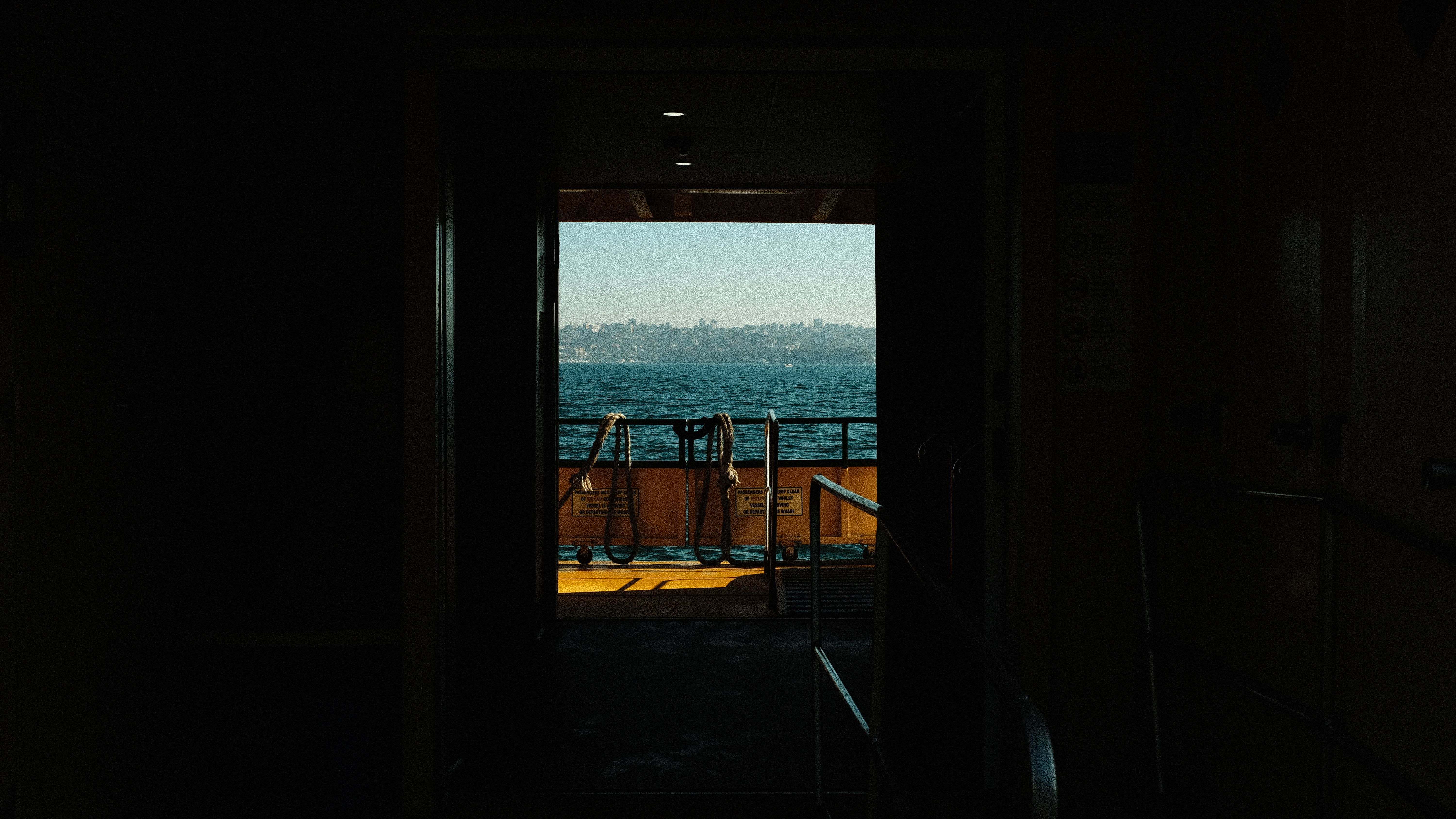 Dark Interior of a Ship with a View of the Sea · Free Stock Photo