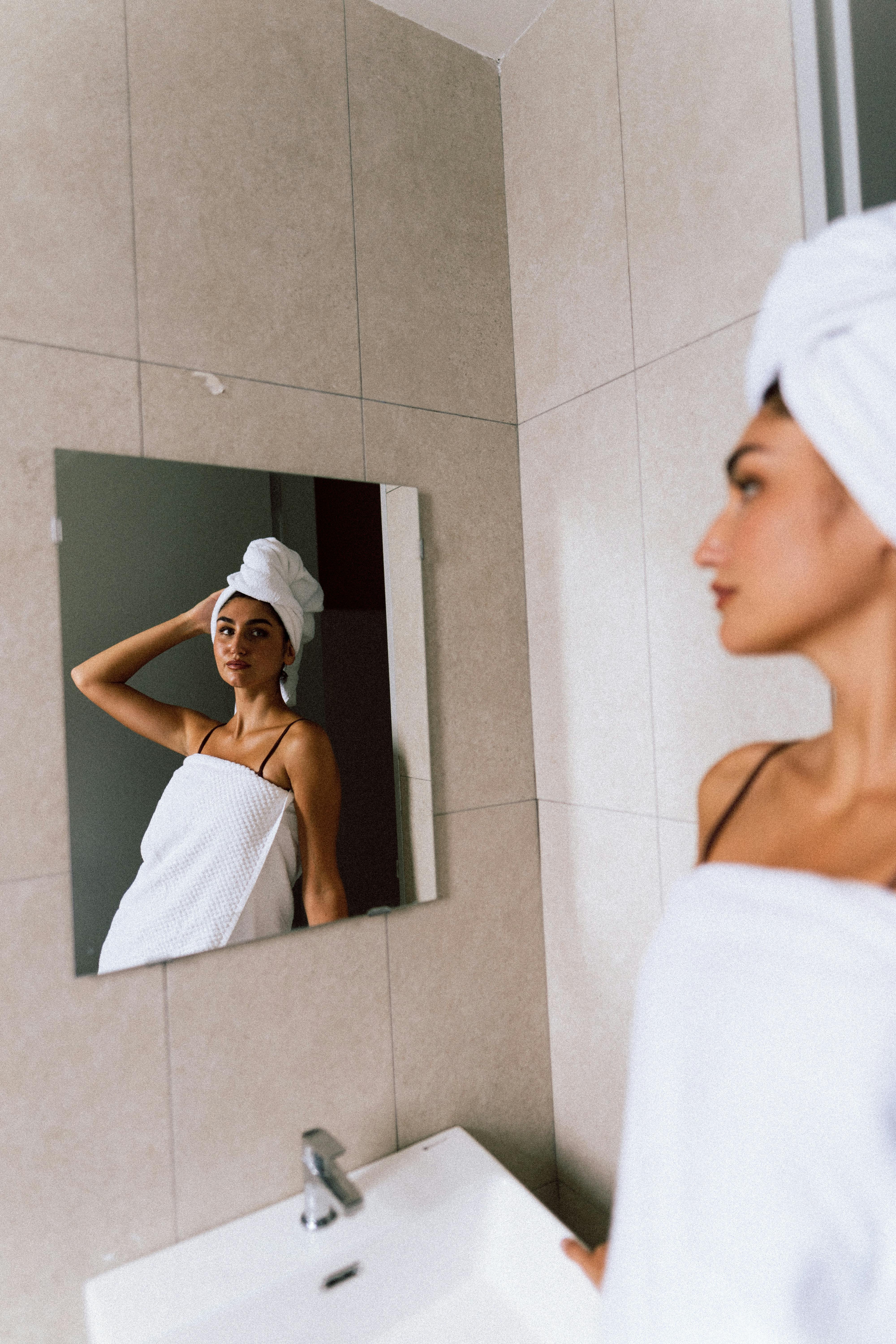 Woman Reflection in Mirror in Bathroom · Free Stock Photo