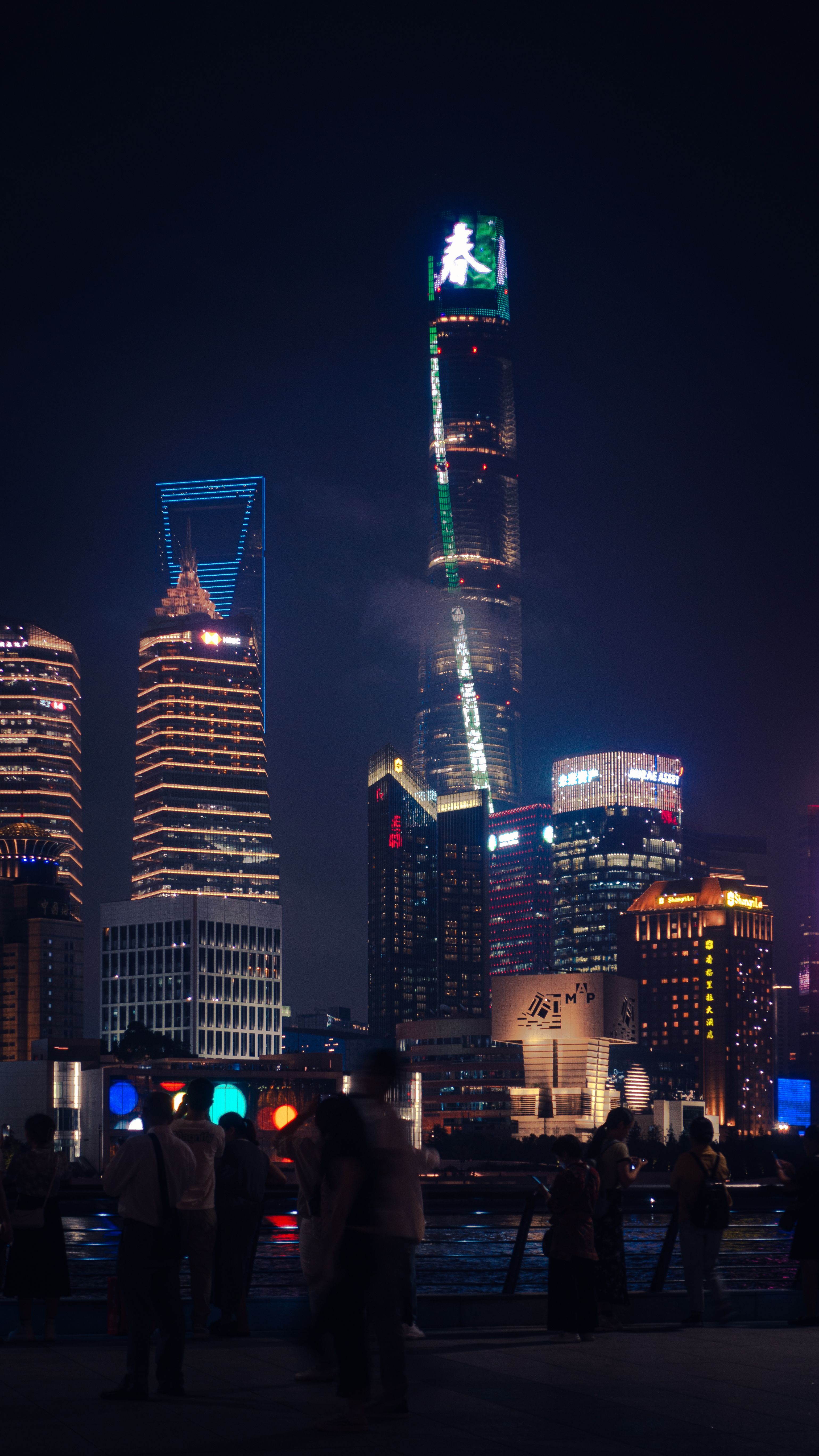 Shanghai Tower over Skyscrapers in Shanghai at Night · Free Stock Photo