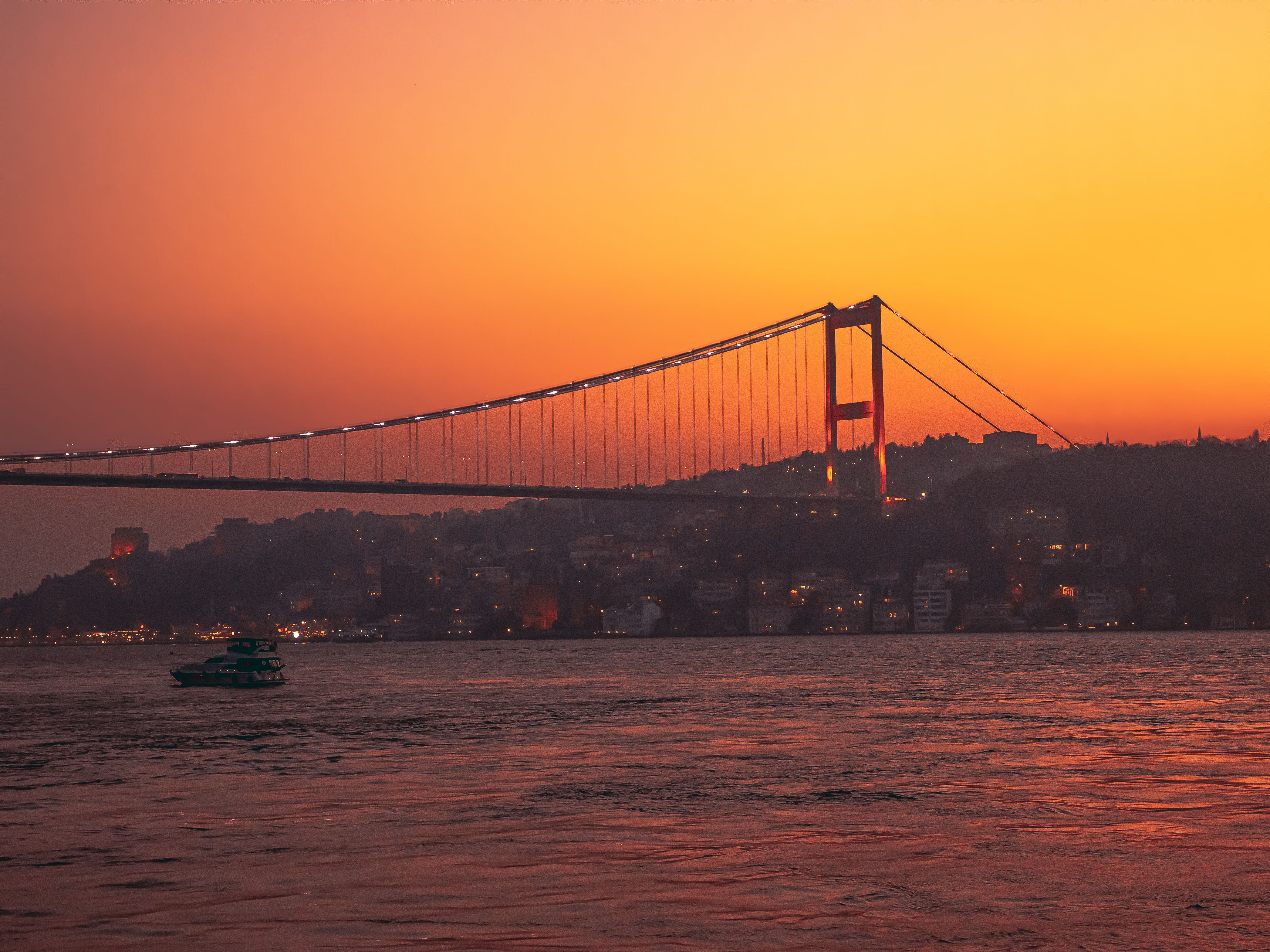A Stunning View of the Bosphorus Bridge at Istanbul During the Night ...