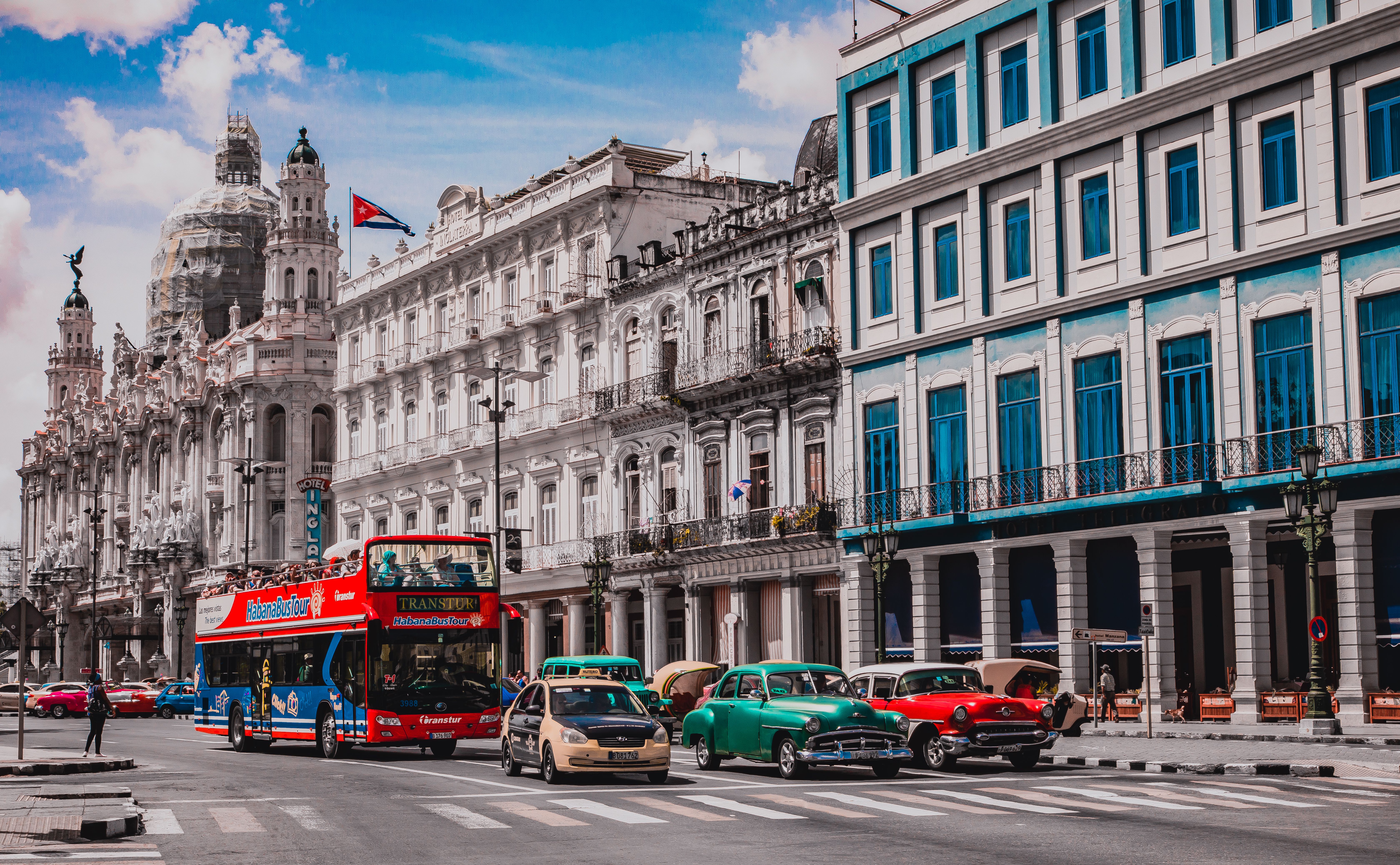 Vintage Cars and Double-Decker Tour Bus near Grand Theater in Havana ...