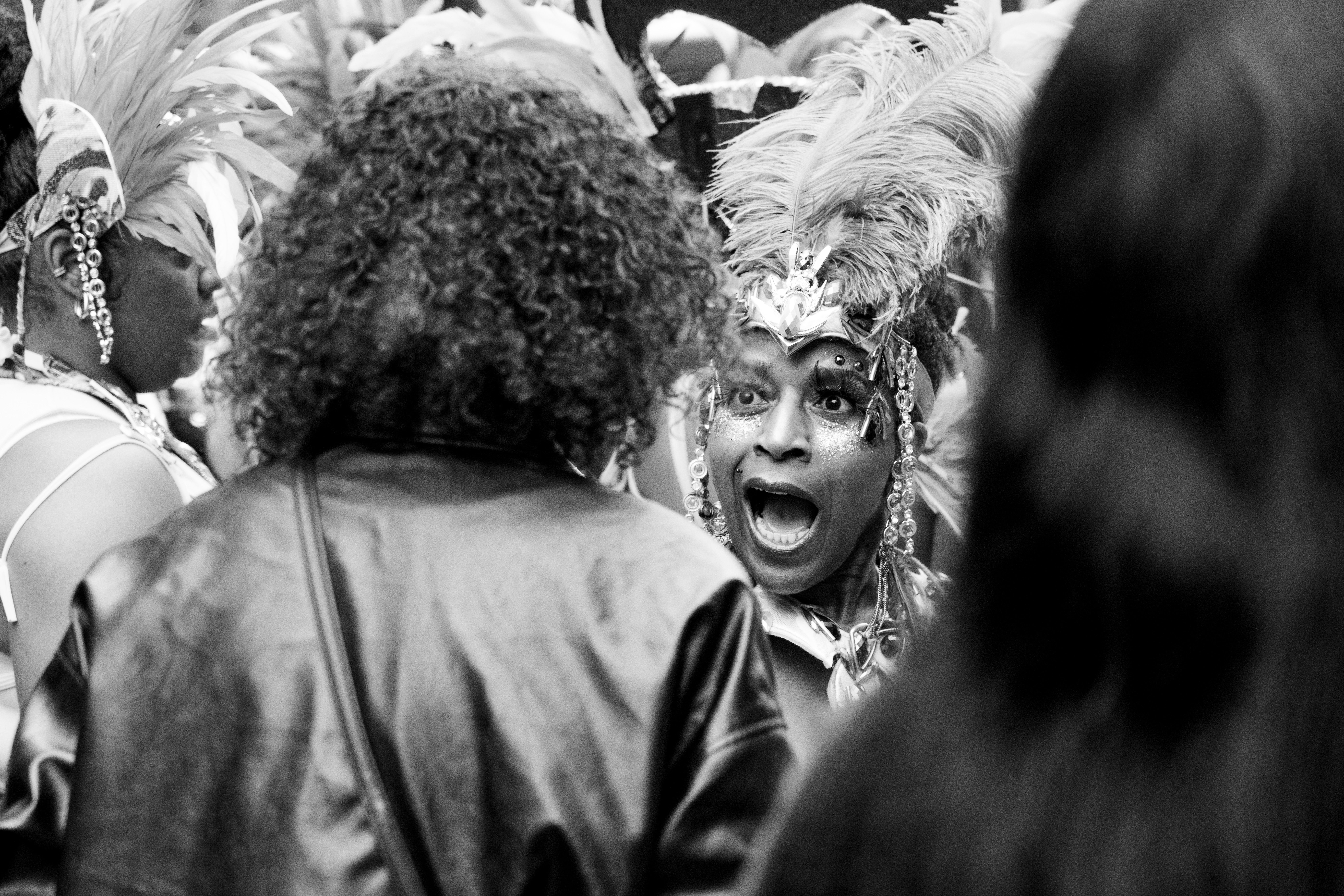 People in Costumes with Feathers on the Street at a Parade · Free Stock ...