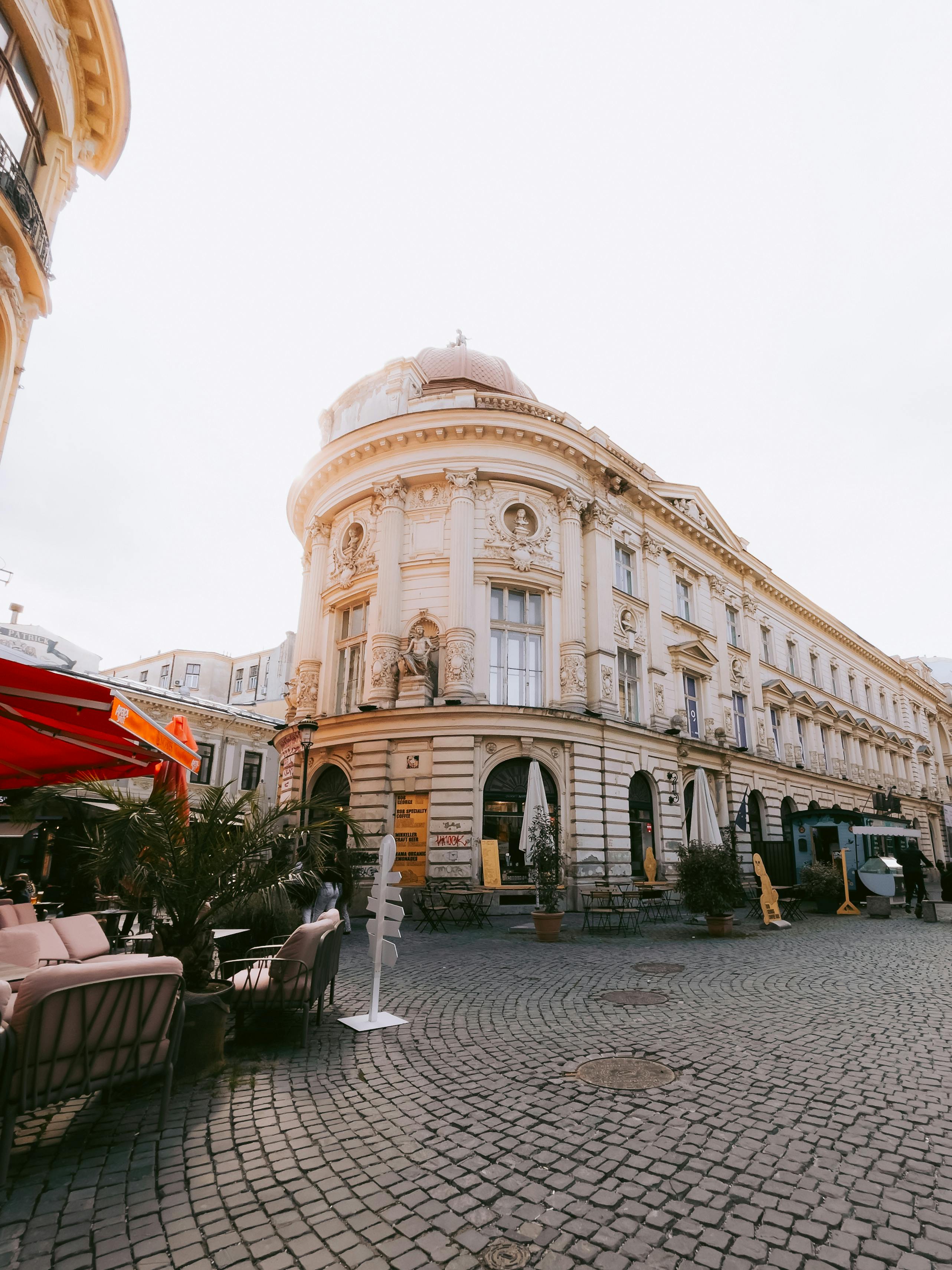 Neoclassical Tenement at Cobblestone Street · Free Stock Photo