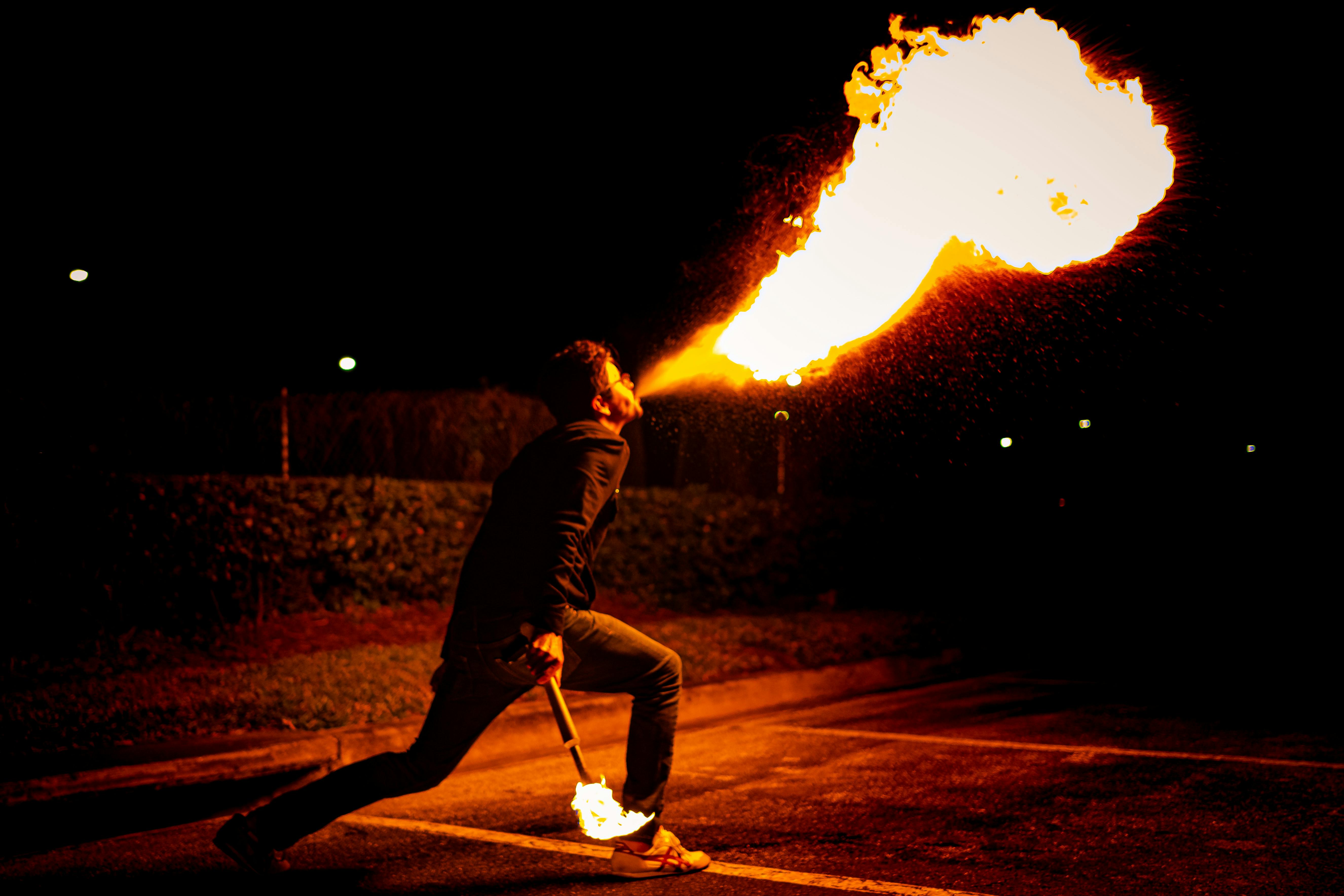 Man Spitting Fire at Night · Free Stock Photo