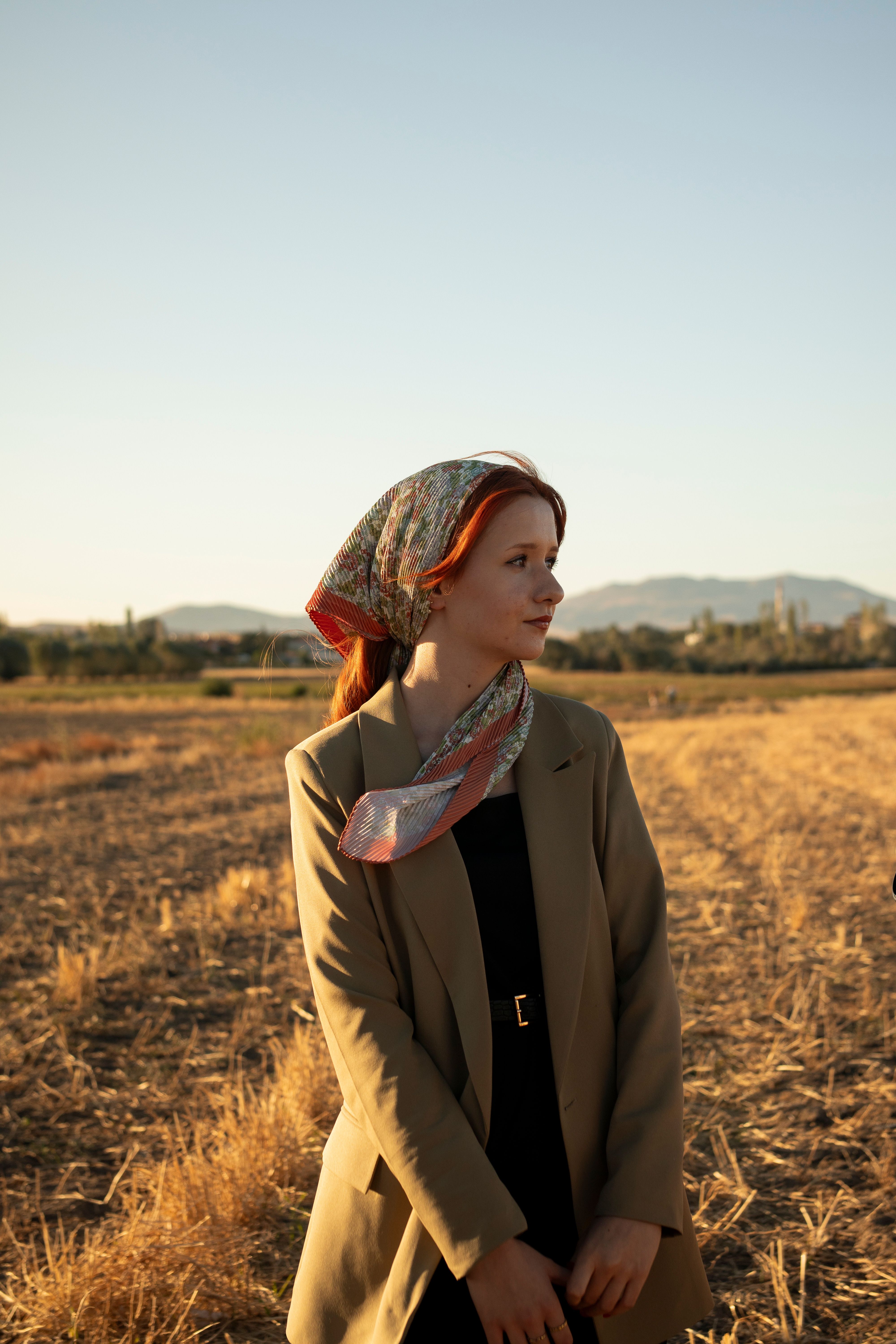Woman Wearing Headscarf on a Field · Free Stock Photo