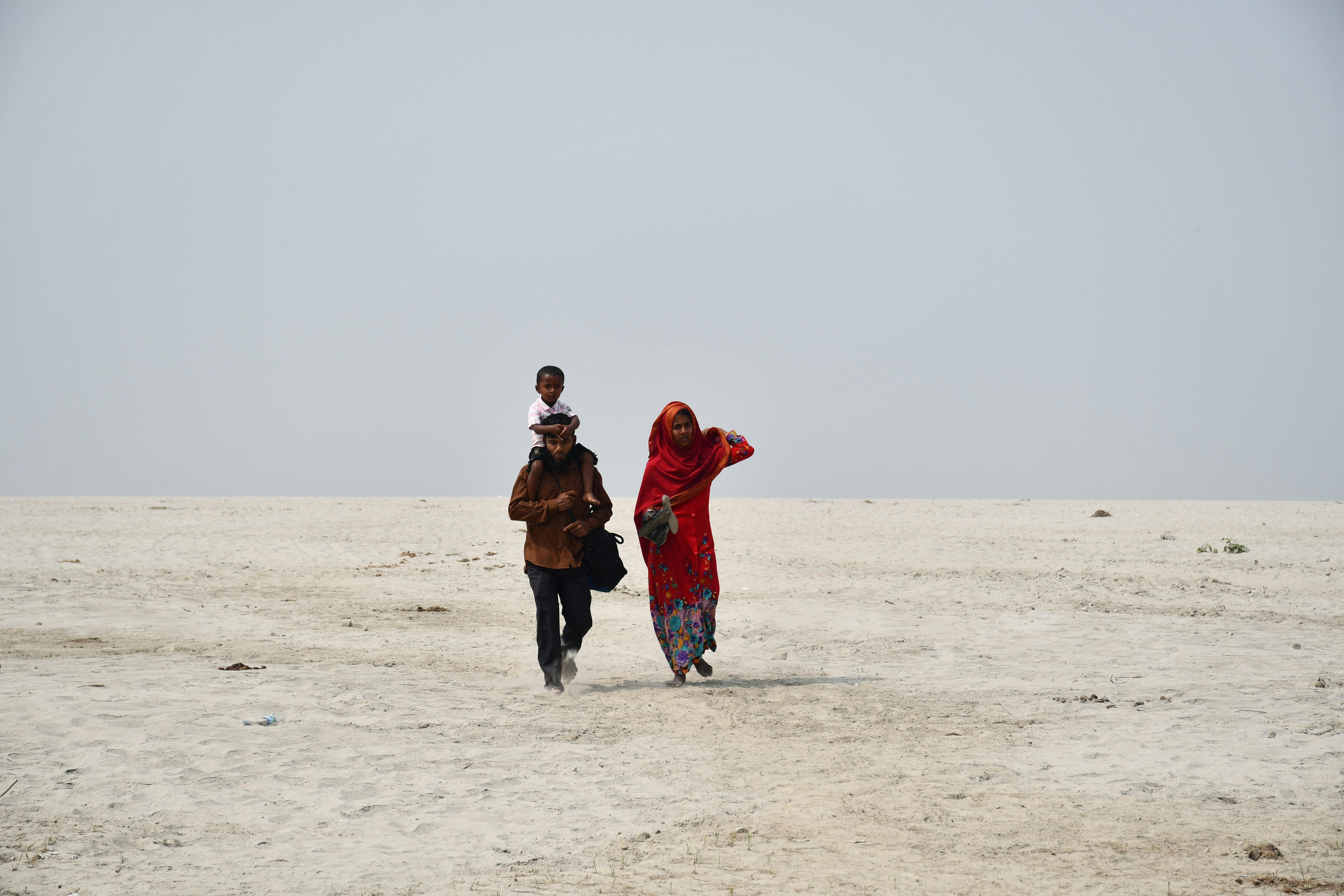 A Family Walking on the Desert · Free Stock Photo