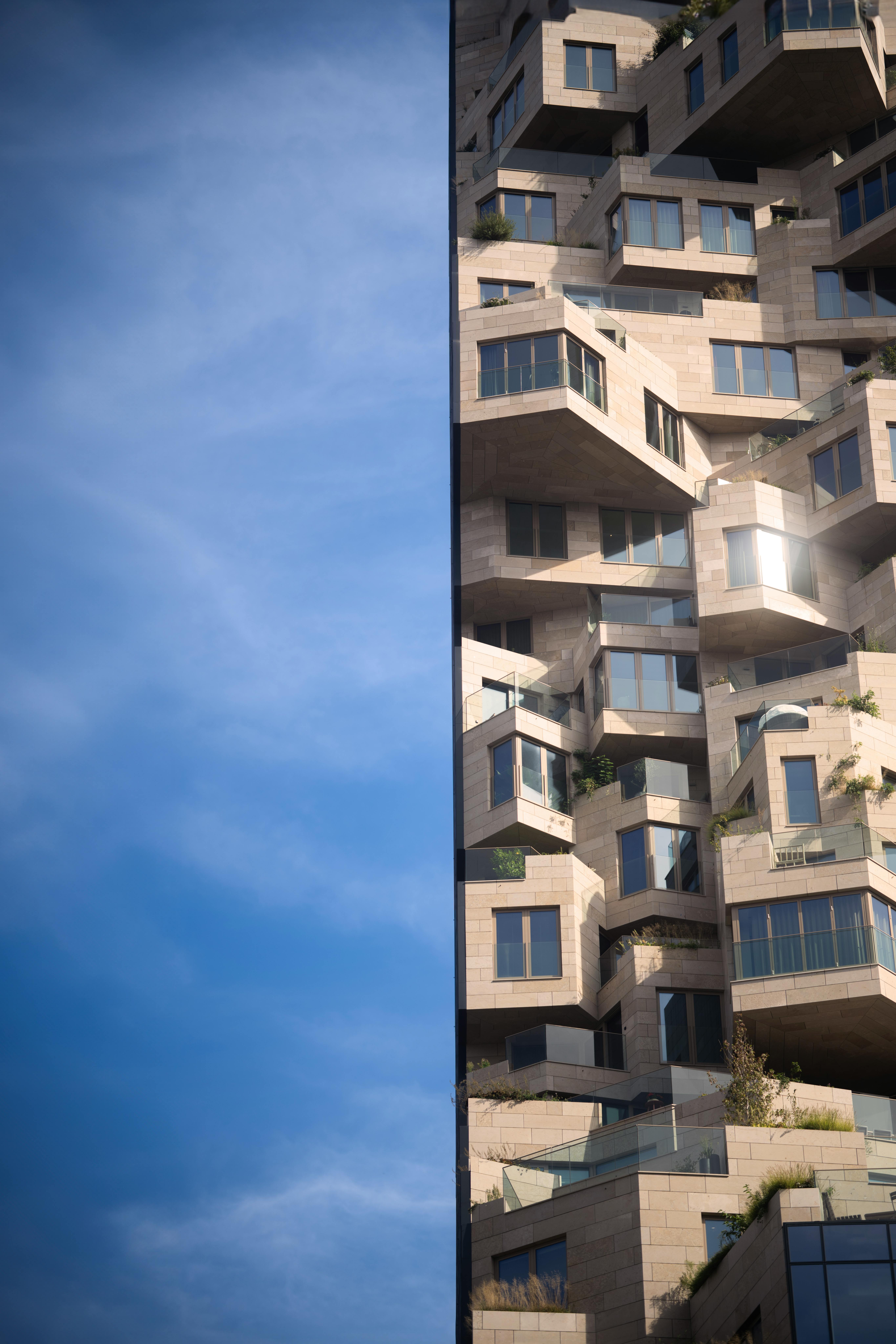 Residential Building Wall near Blue Sky · Free Stock Photo