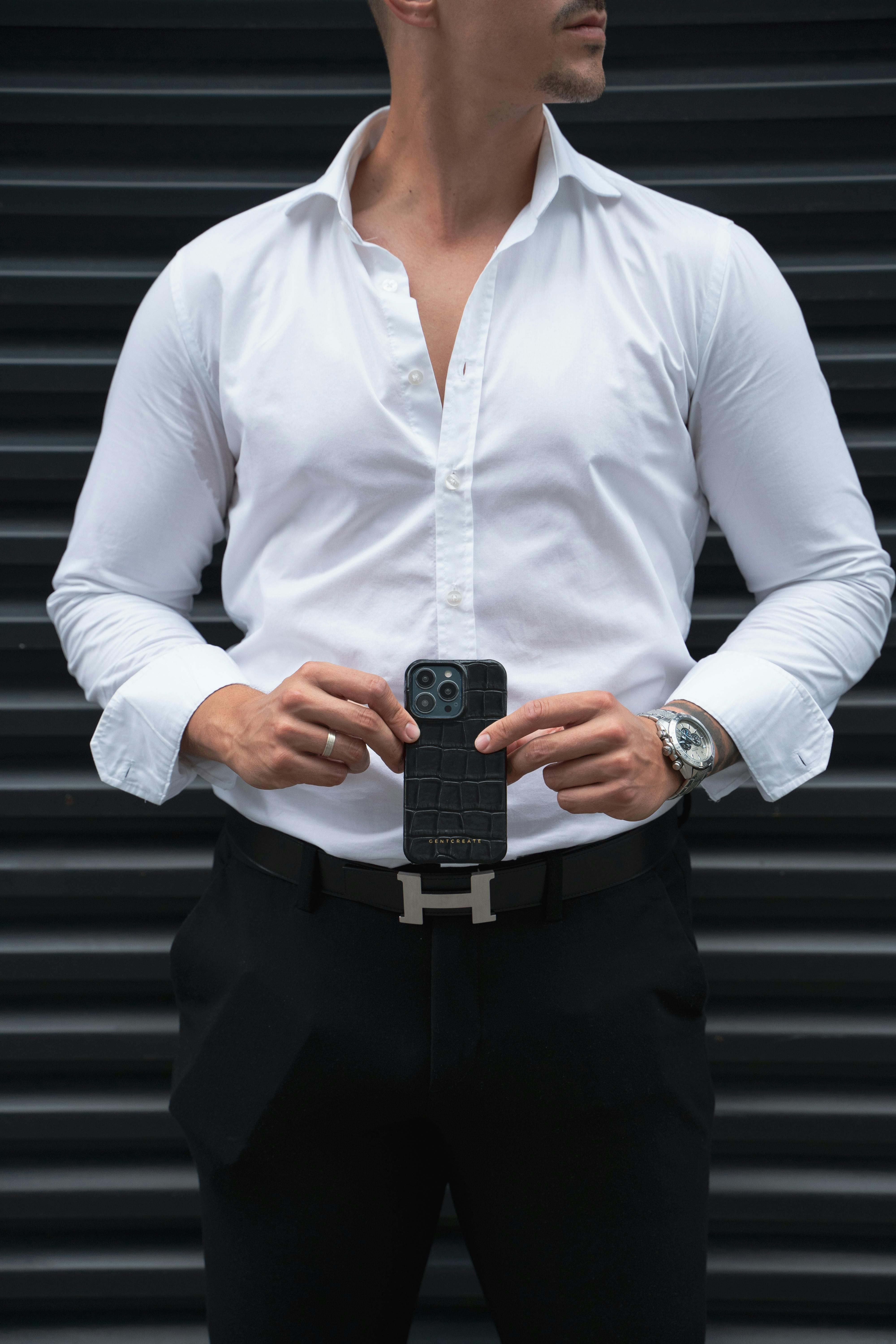 Handsome Man Holding an iPhone 15, 14, 13 Case by GENTCREATE · Free ...