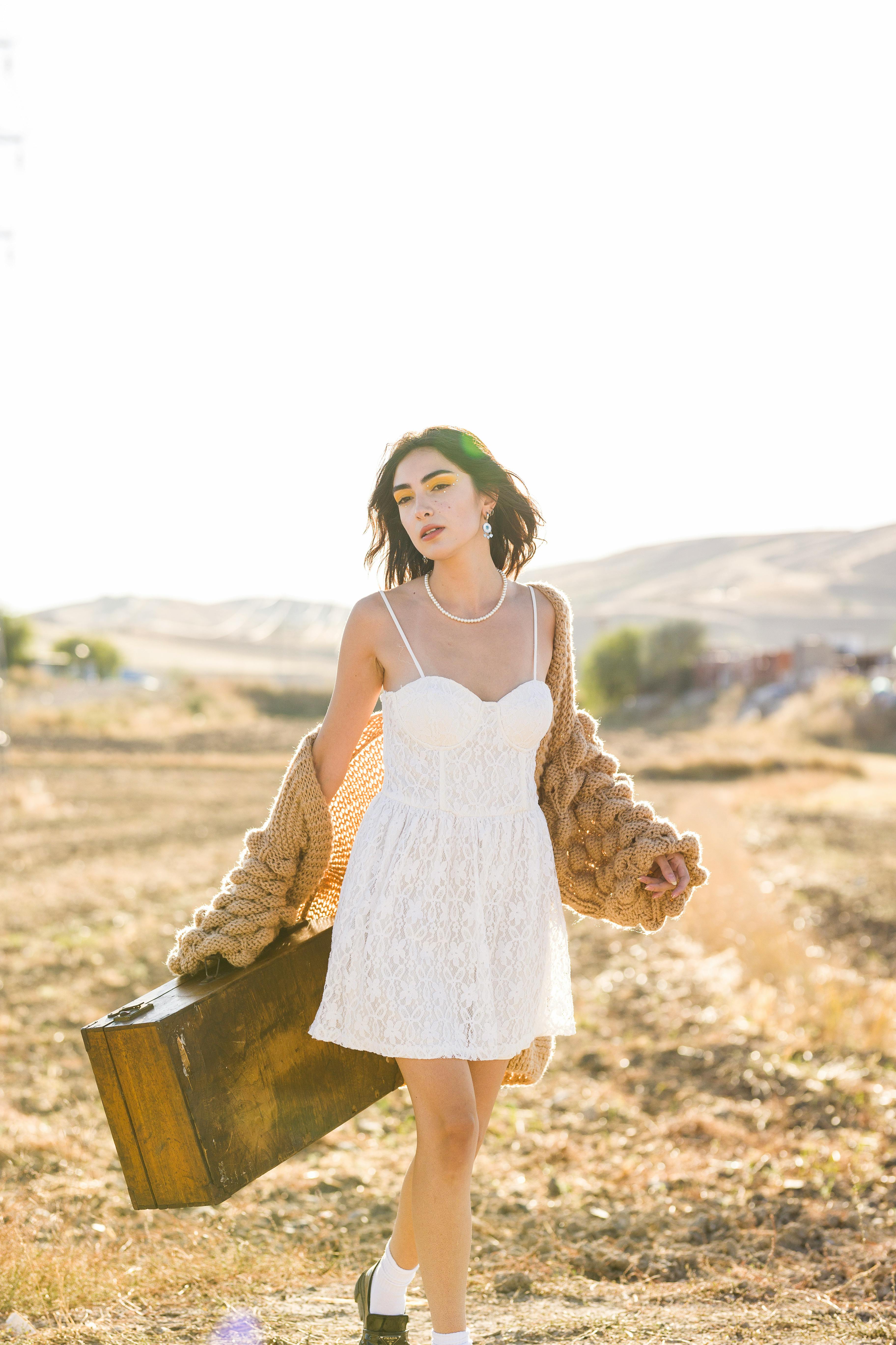 Woman in Dress and Cardigan in Countryside · Free Stock Photo