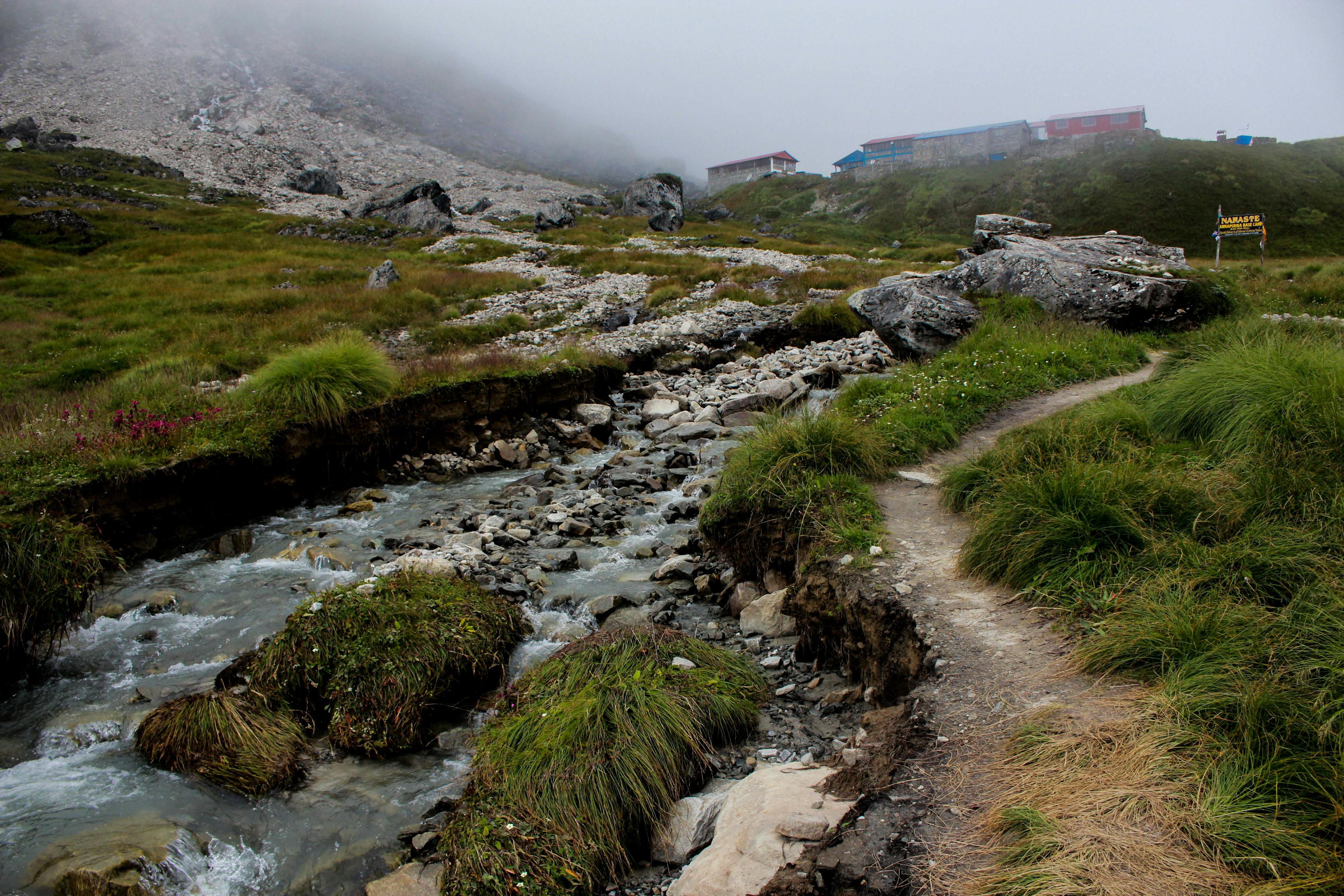 Mountain Stream Carving its Bed in the Rocky Ground · Free Stock Photo