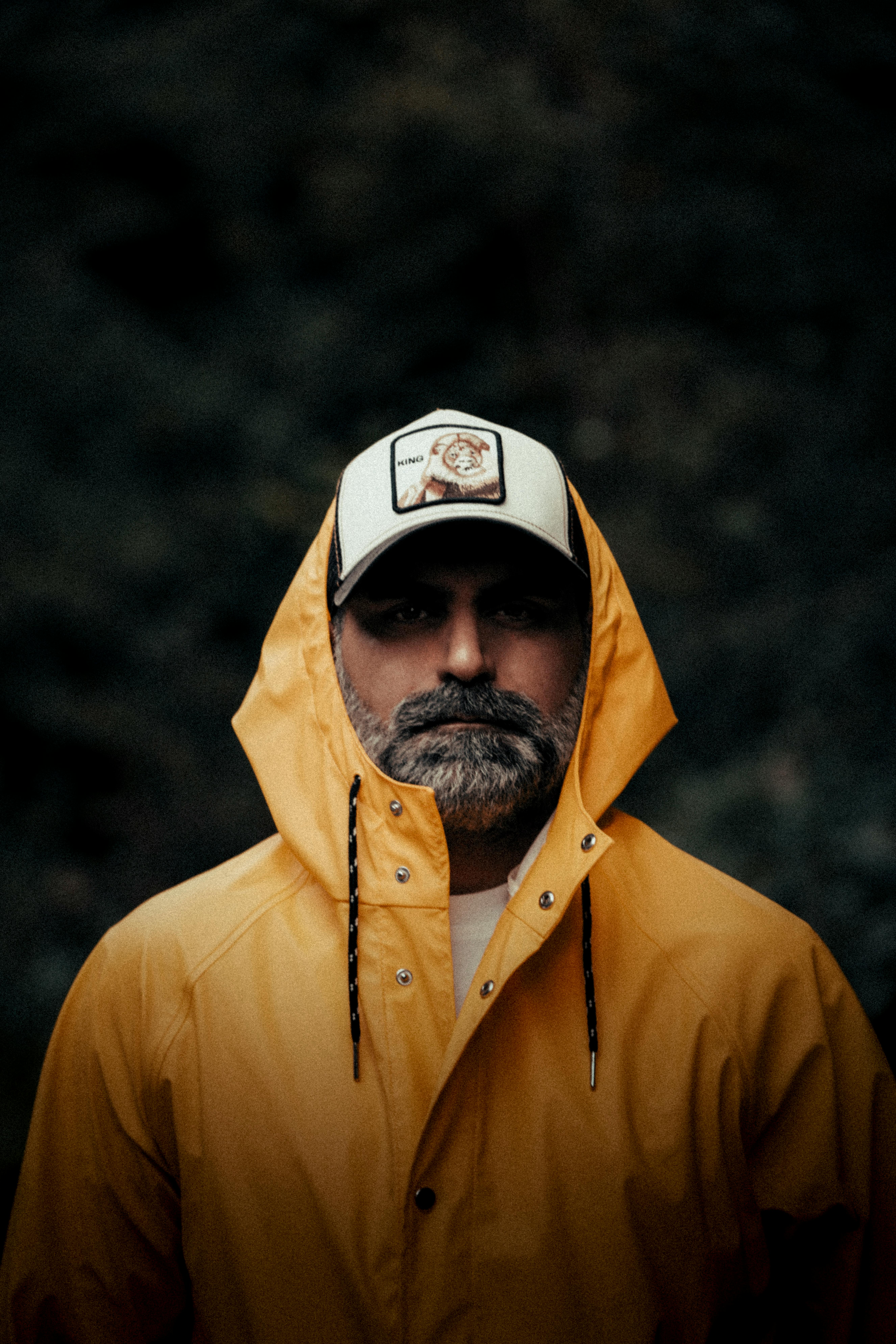 Portrait of Man in Yellow Jacket · Free Stock Photo