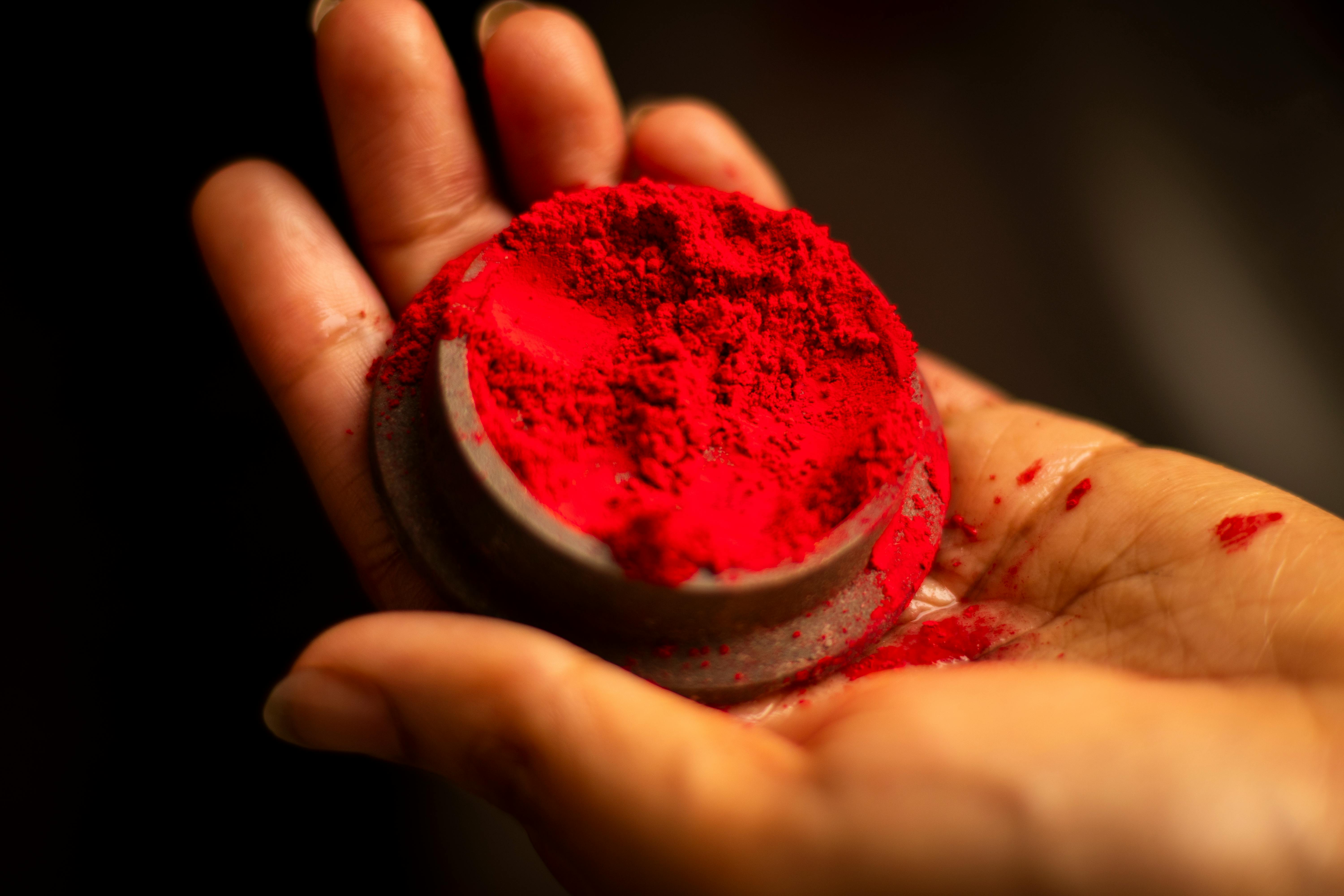 A Woman Screaming with Red Powder on Her Face · Free Stock Photo