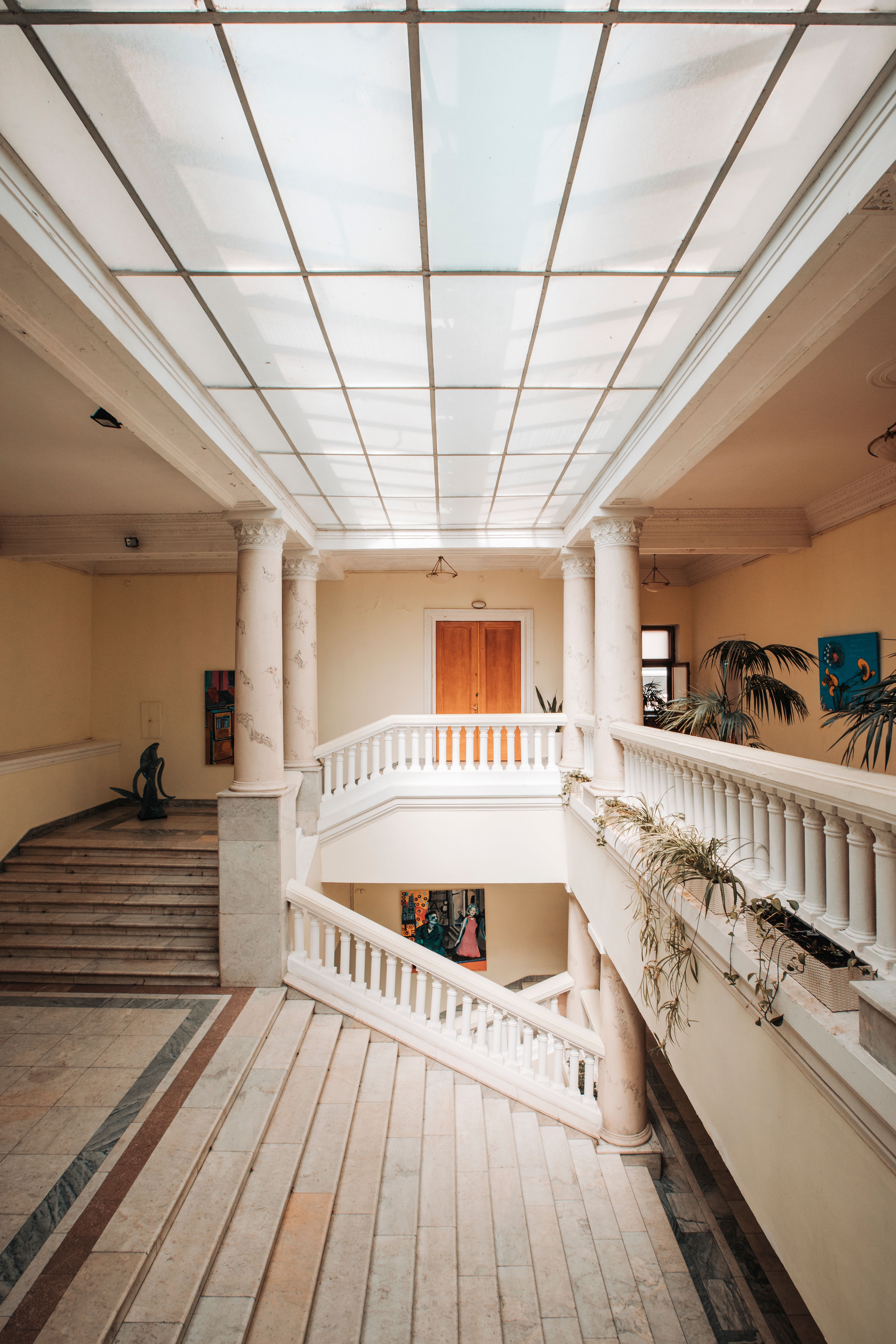 Quiet School Hallway with Open Door and Sign · Free Stock Photo