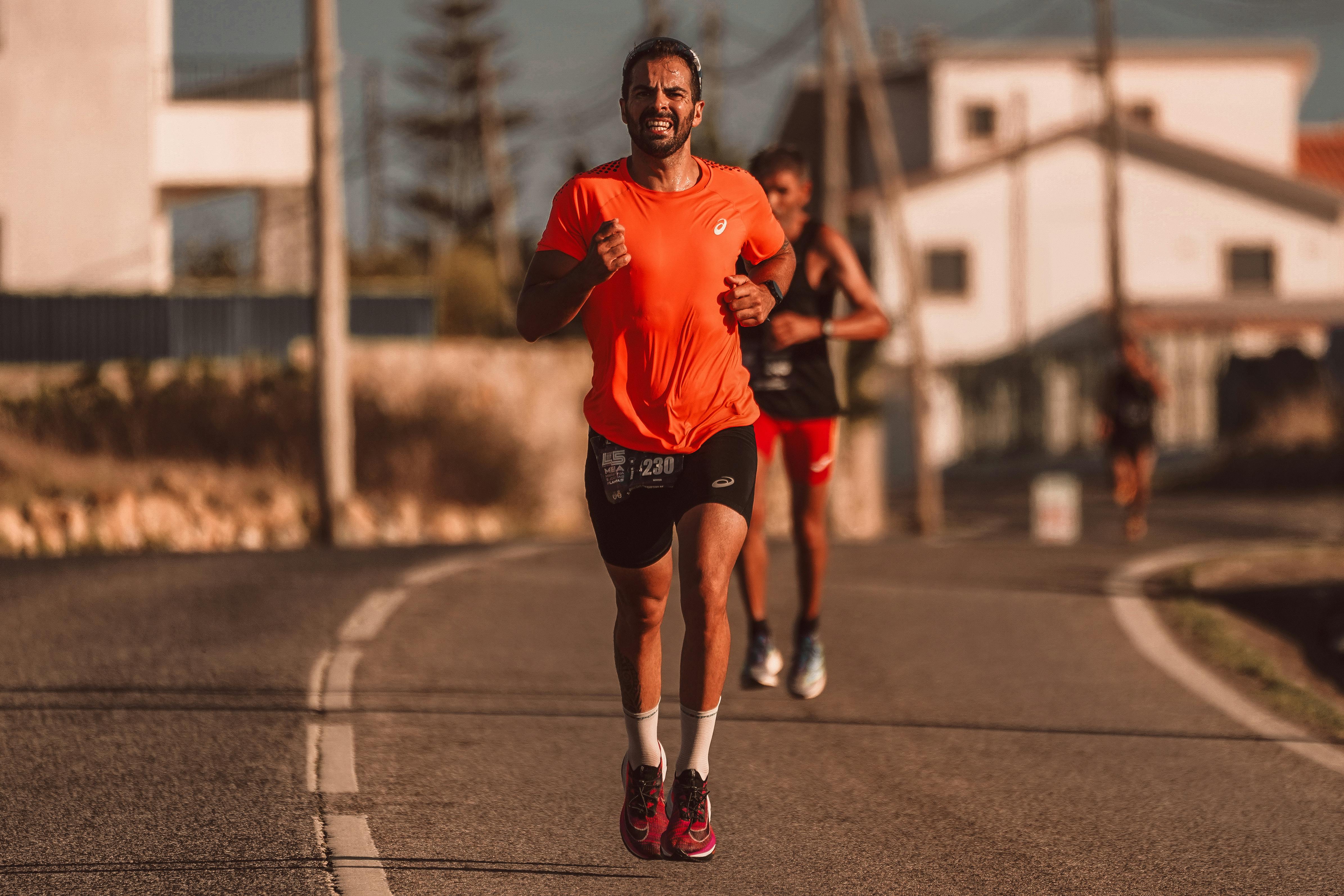 Man Jogging along Street · Free Stock Photo