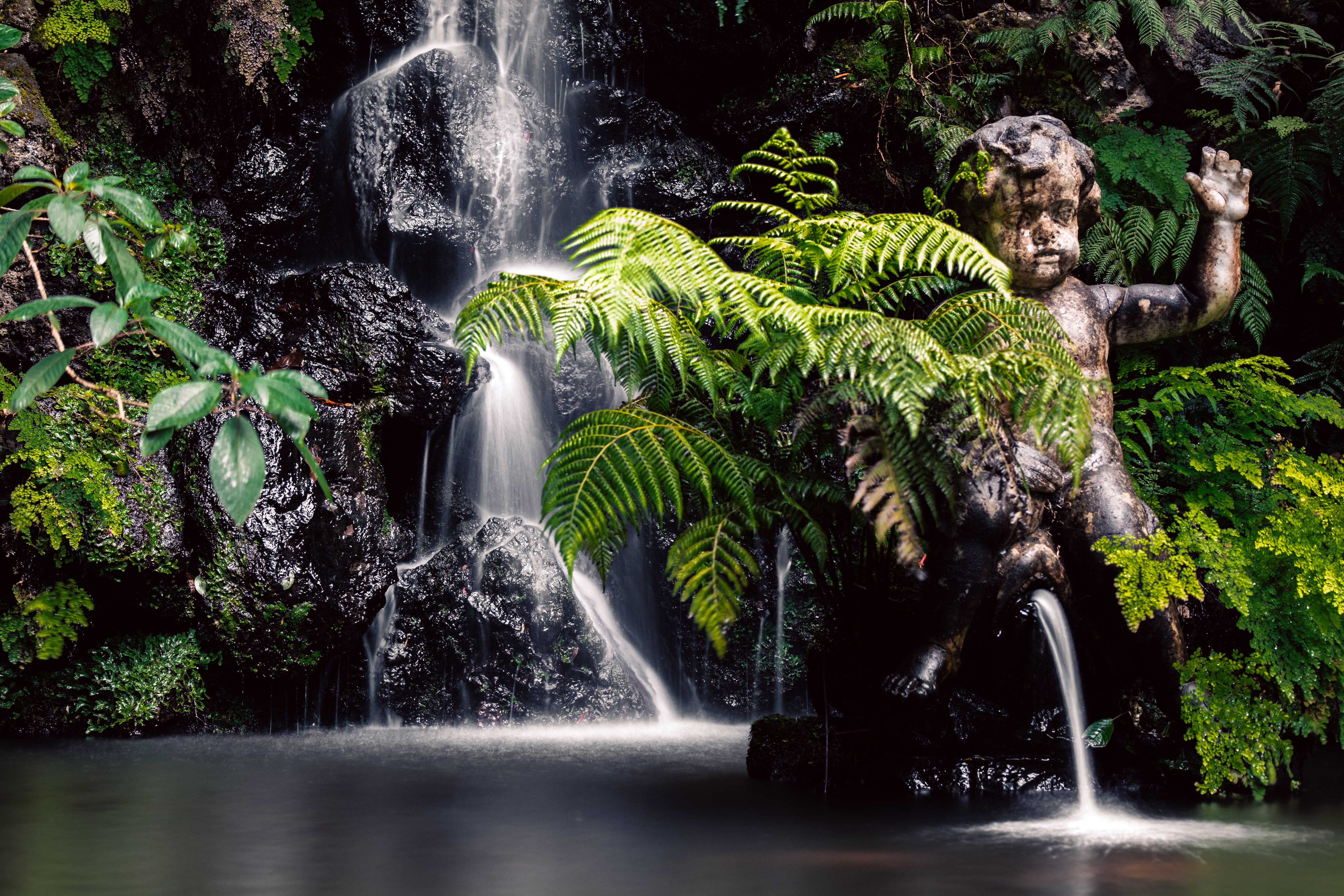 Statue near Waterfall in Tropical Forest · Free Stock Photo