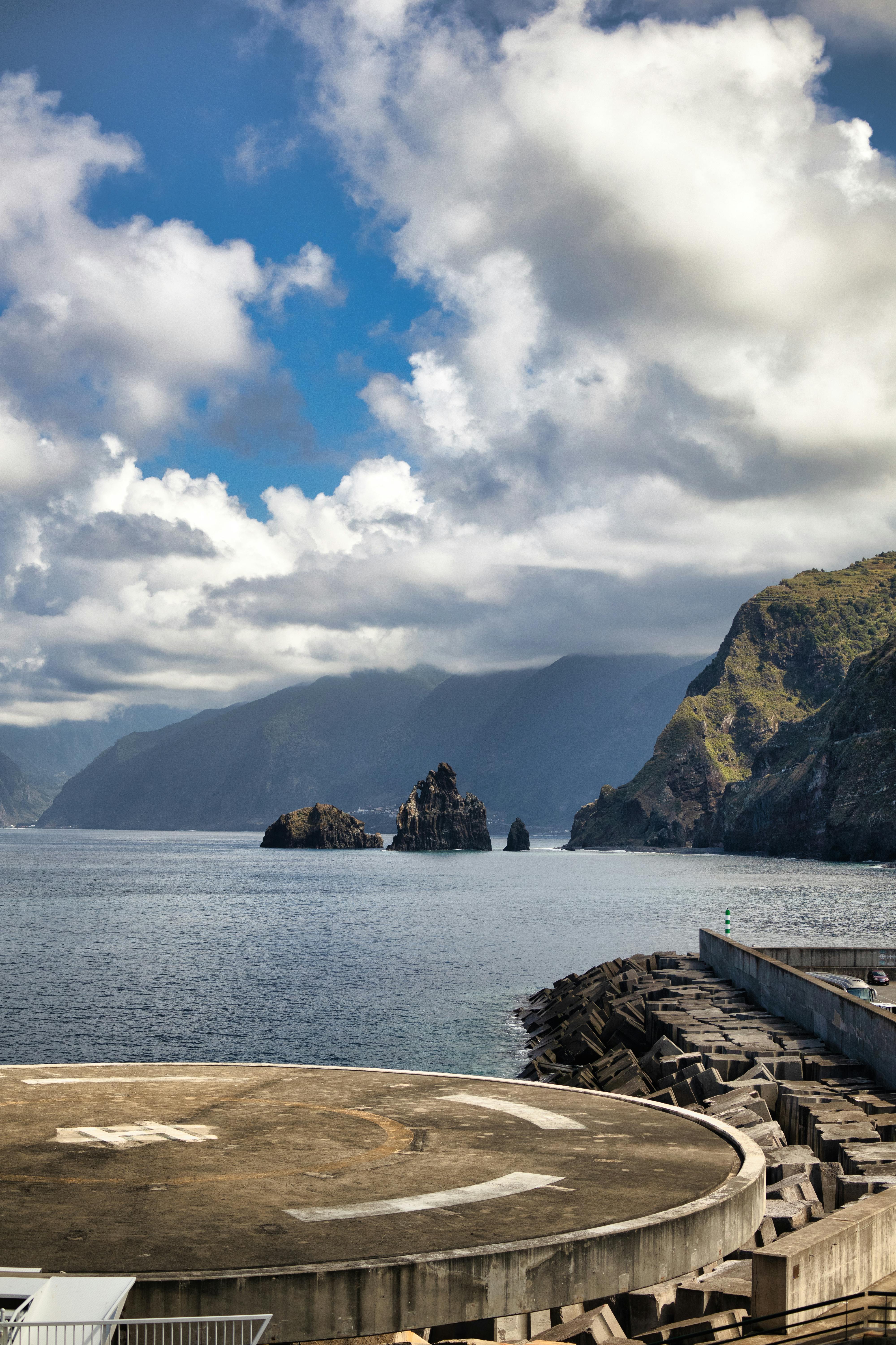 Pavement on Sea Coast with Rocks behind · Free Stock Photo
