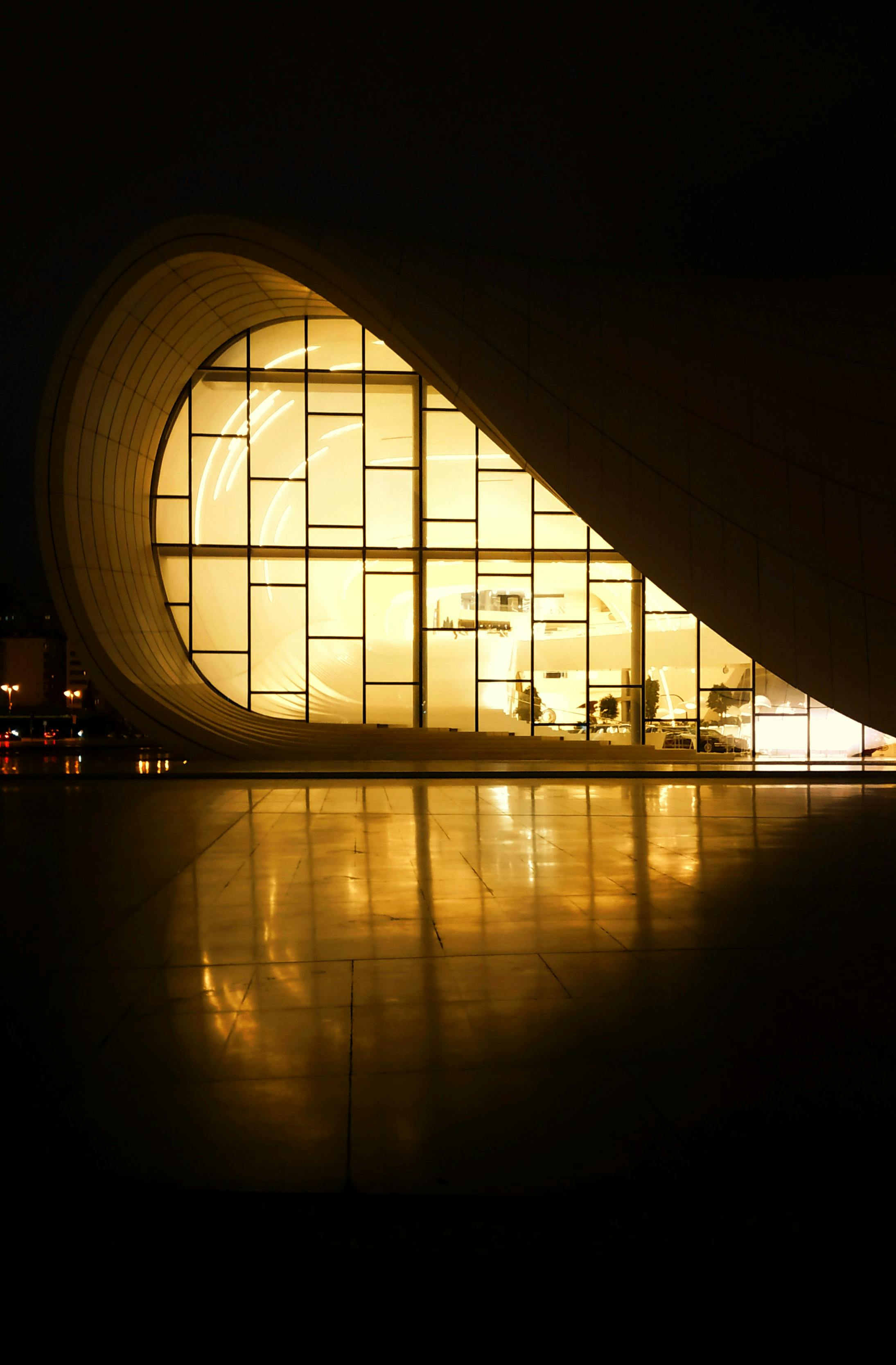 Illuminated Windows of Heydar Aliyev Center at Night · Free Stock Photo