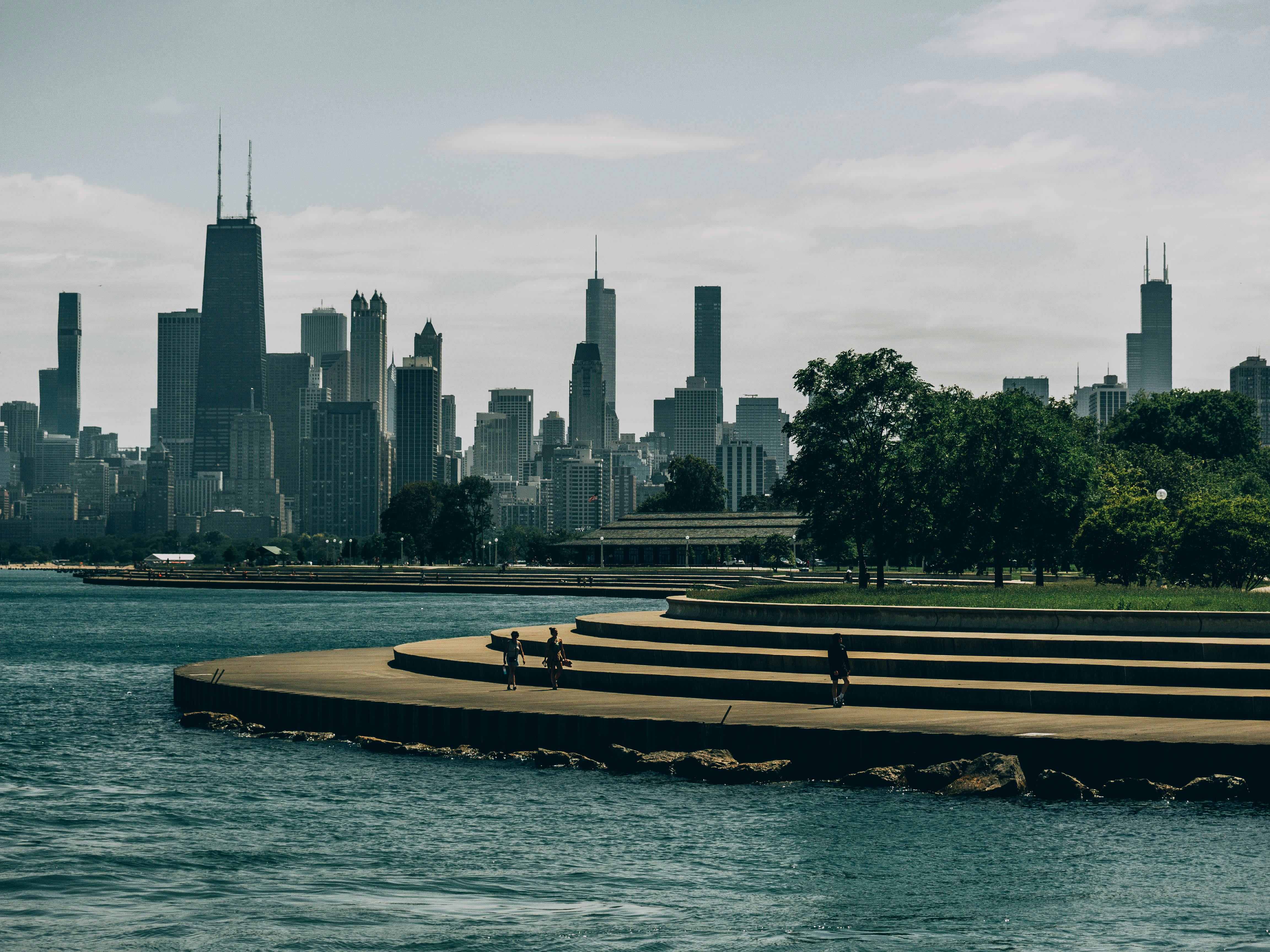 Promenade along City River · Free Stock Photo