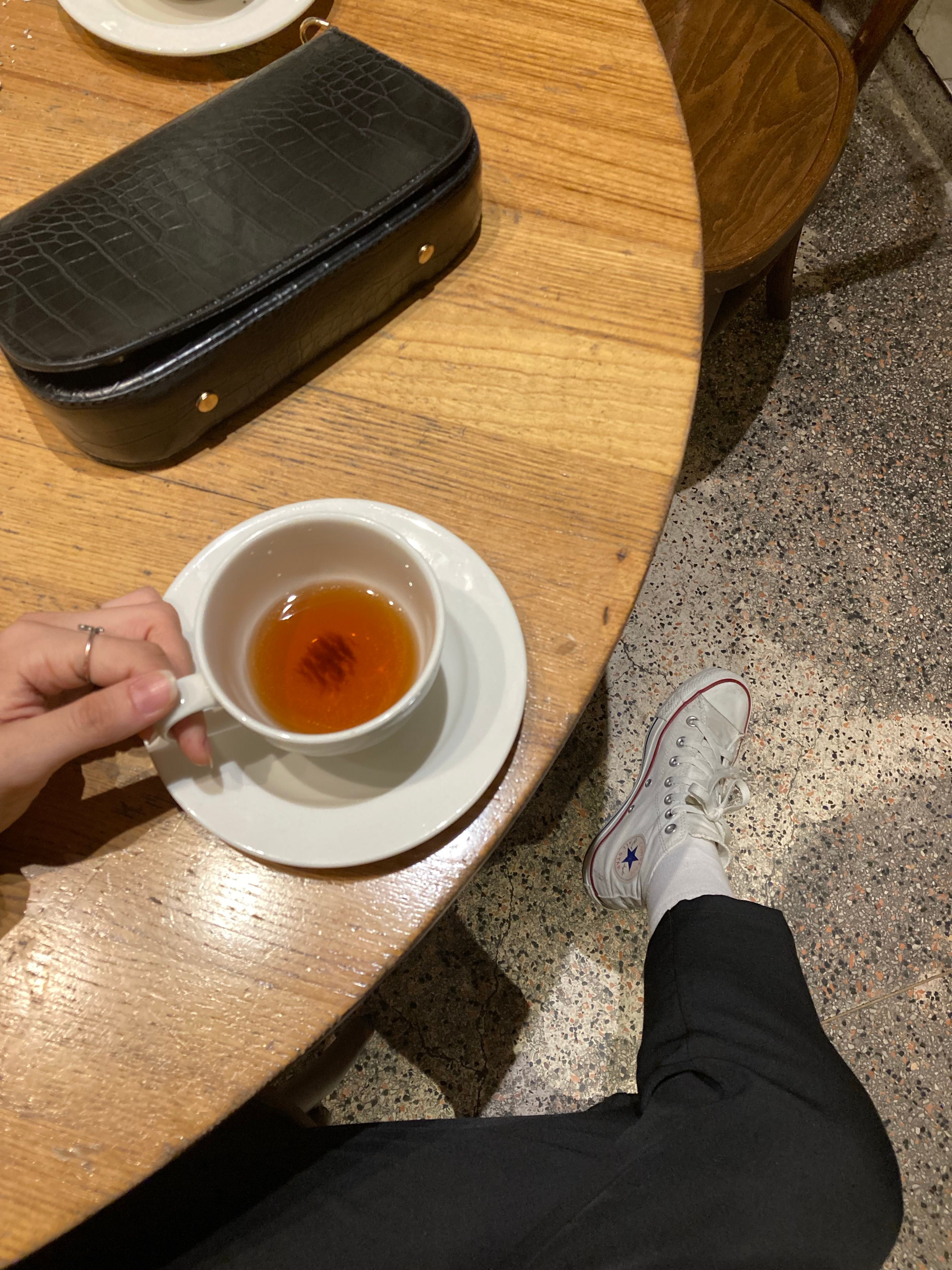 Cozy Indoor Tea Time with Stylish Outfit · Free Stock Photo