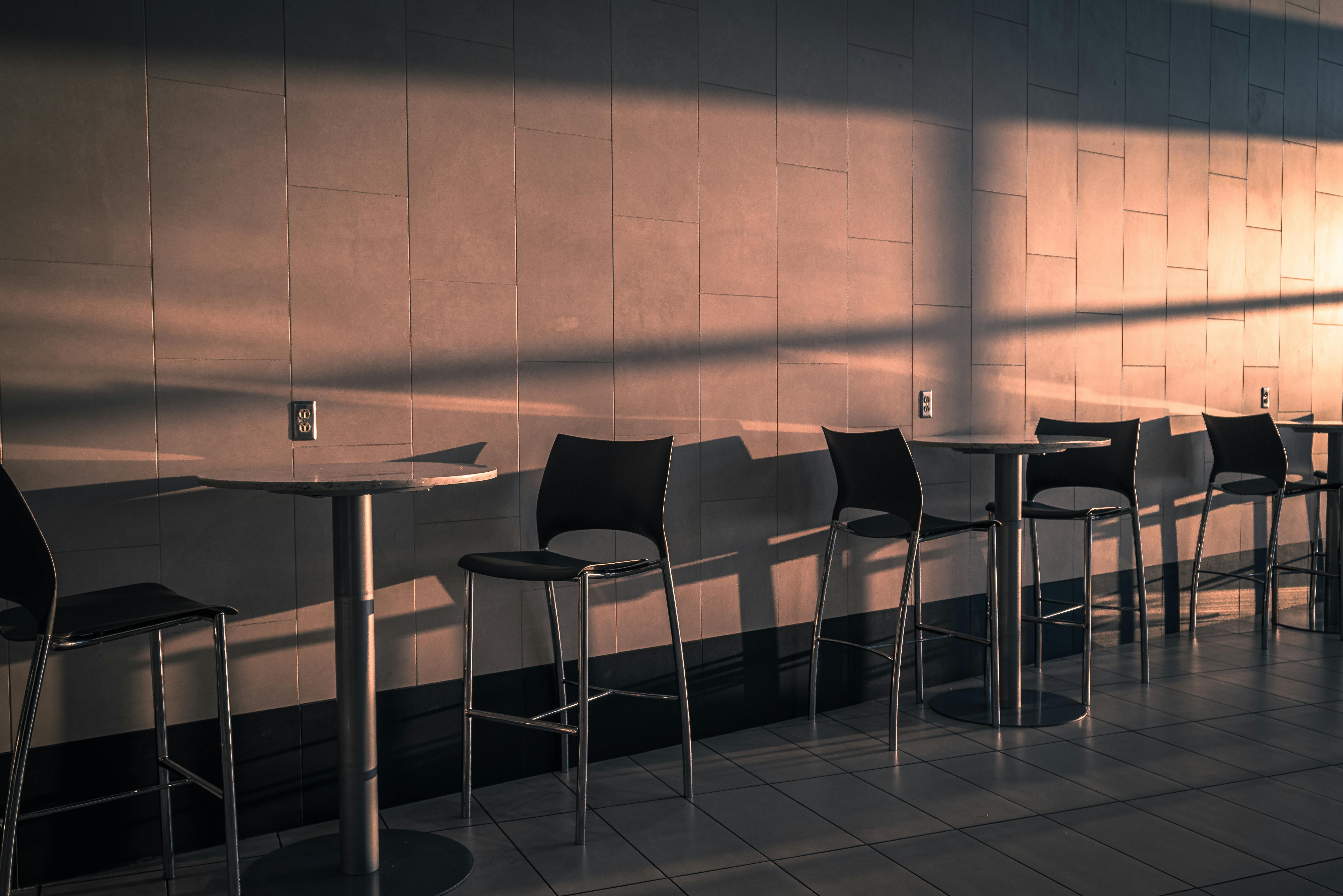 Sunlit Building Wall with Plants · Free Stock Photo