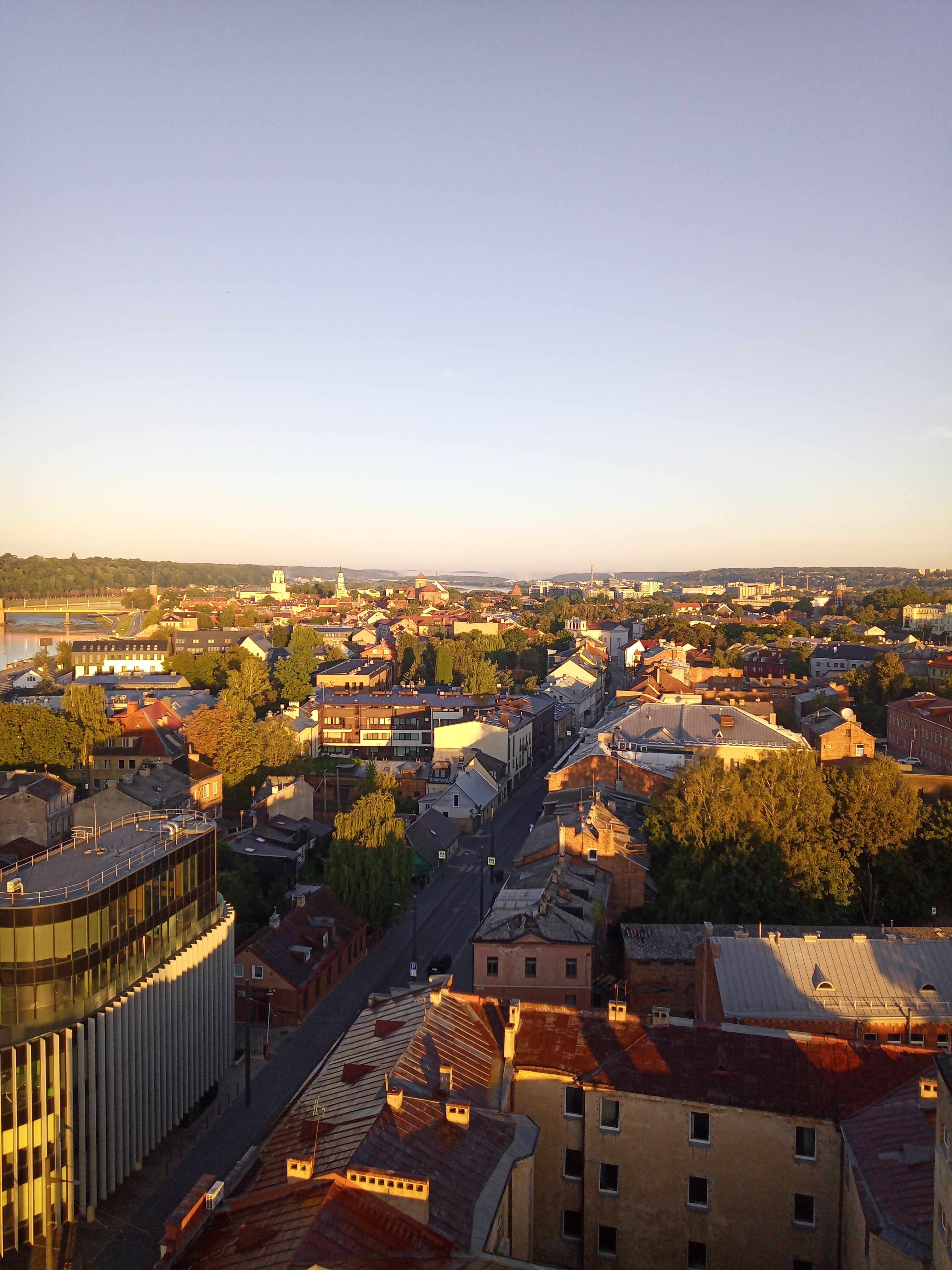 Aerial Photo of City Rooftops at Sunset · Free Stock Photo