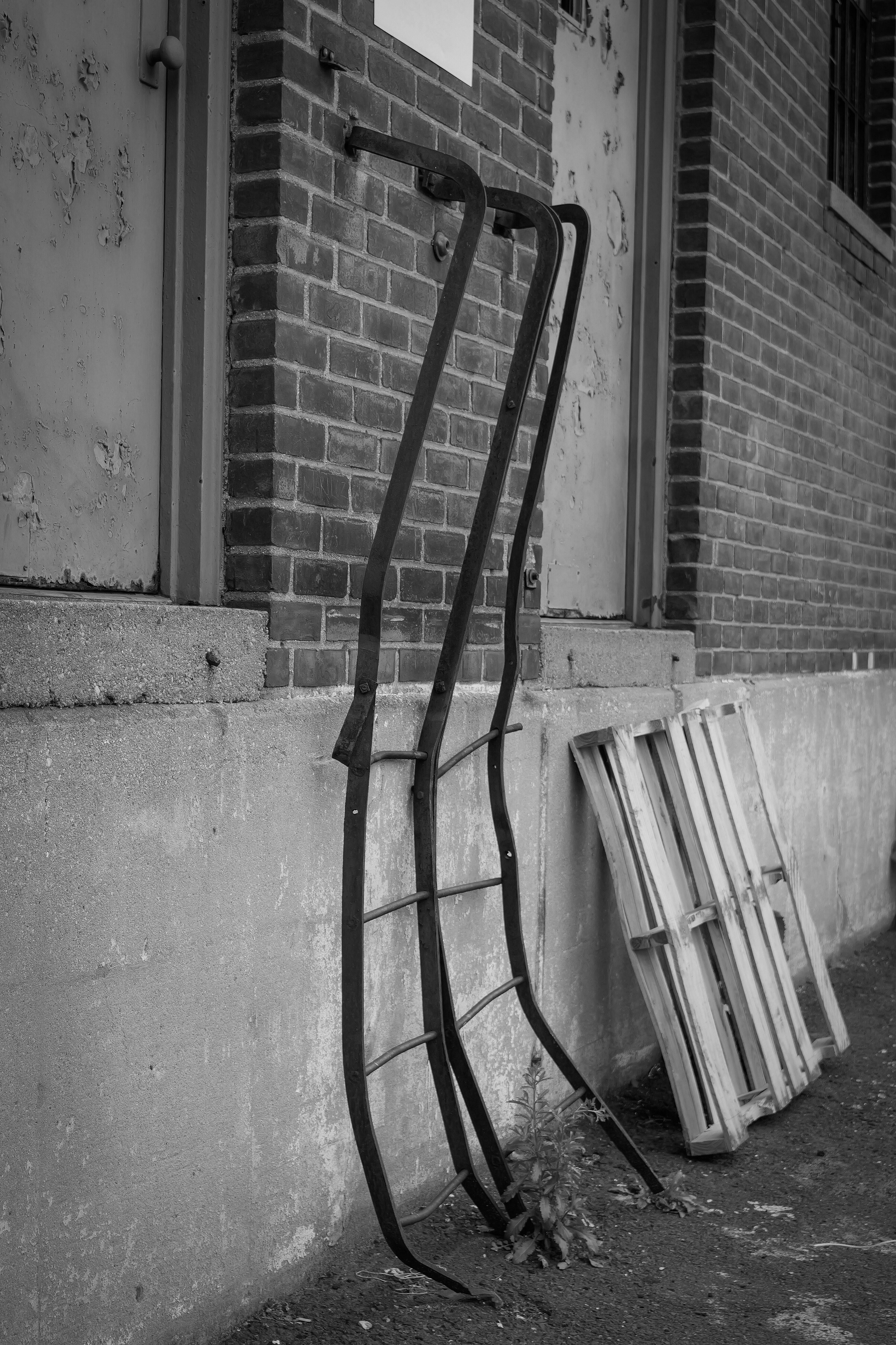 A Broken Steel Ladder Attached to a Building · Free Stock Photo